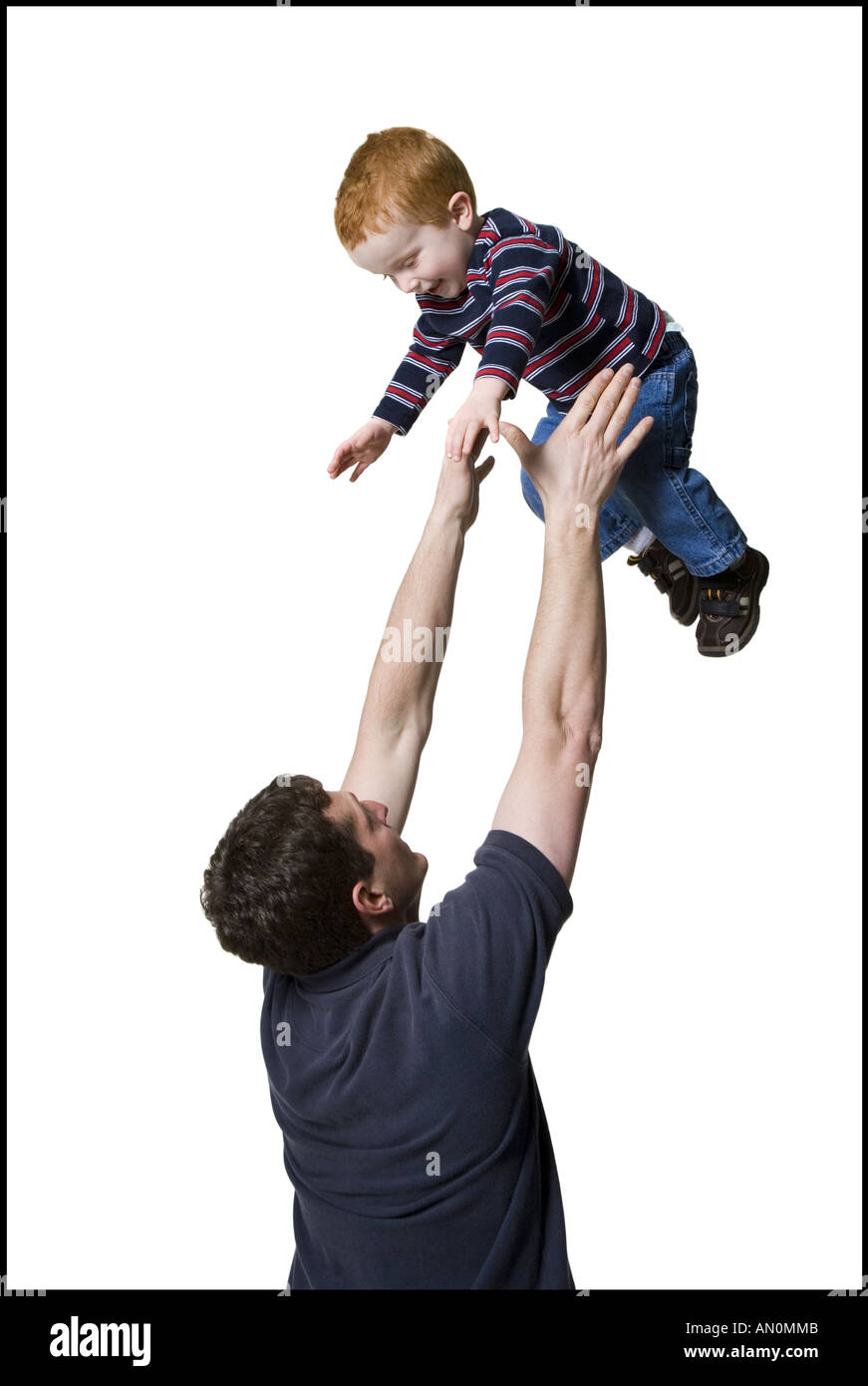 Profile of a father catching his son Stock Photo - Alamy