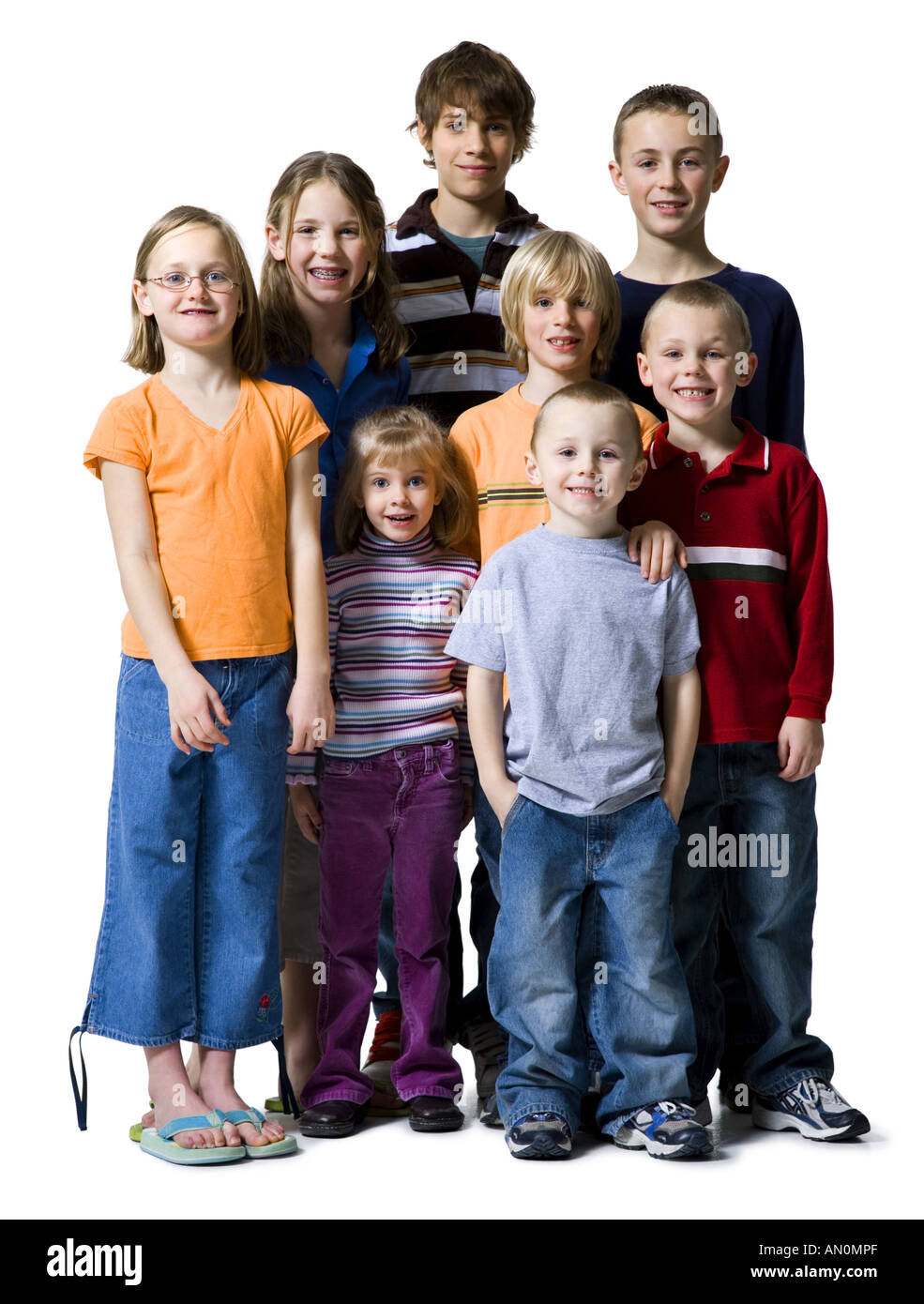 Portrait of a group of children standing together Stock Photo - Alamy
