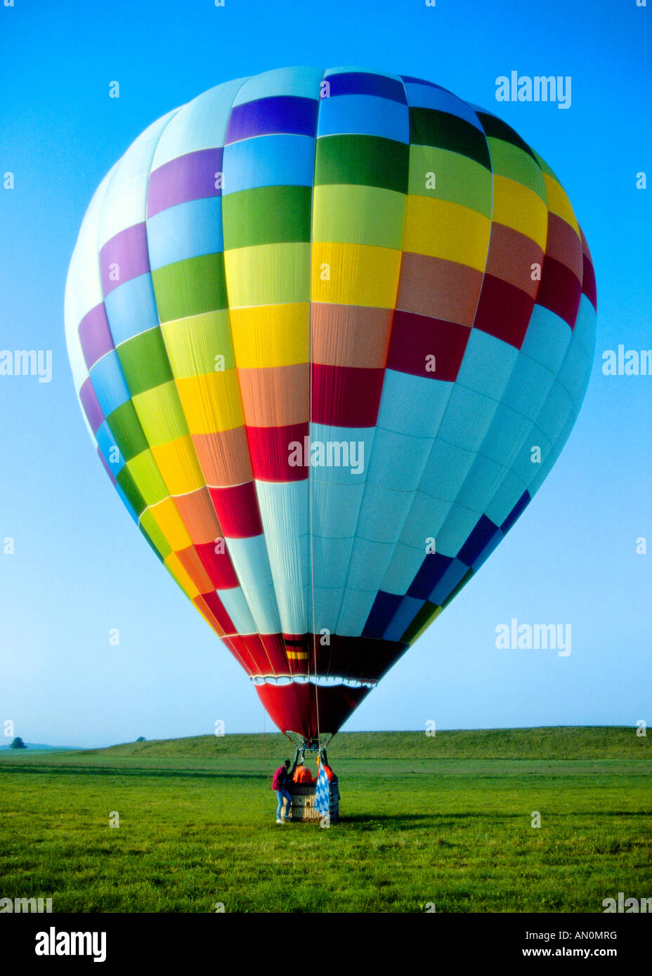 Passengers climbing into hot air balloon basket hi-res stock ...