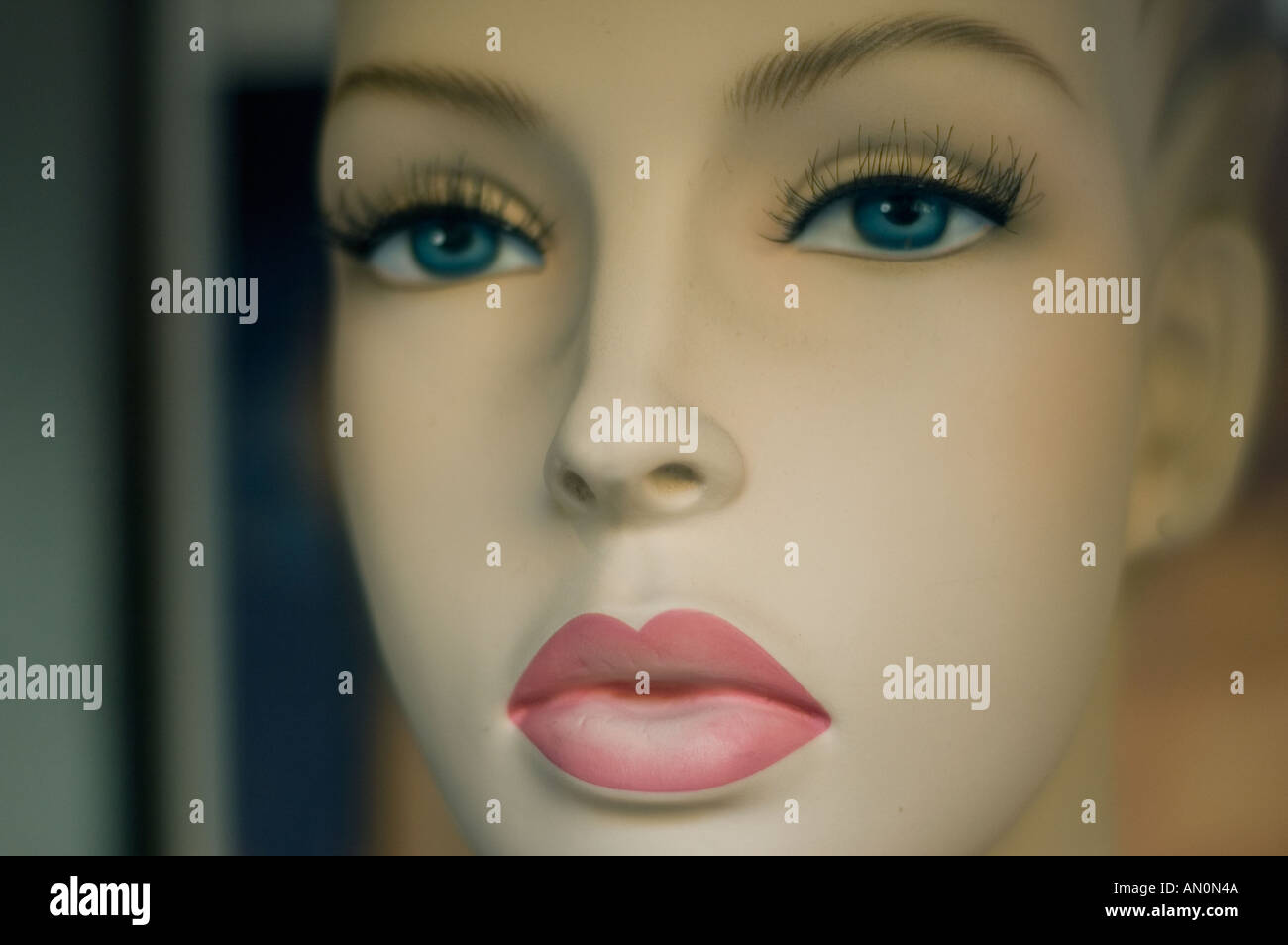 Manequin in a shop window display Stock Photo - Alamy