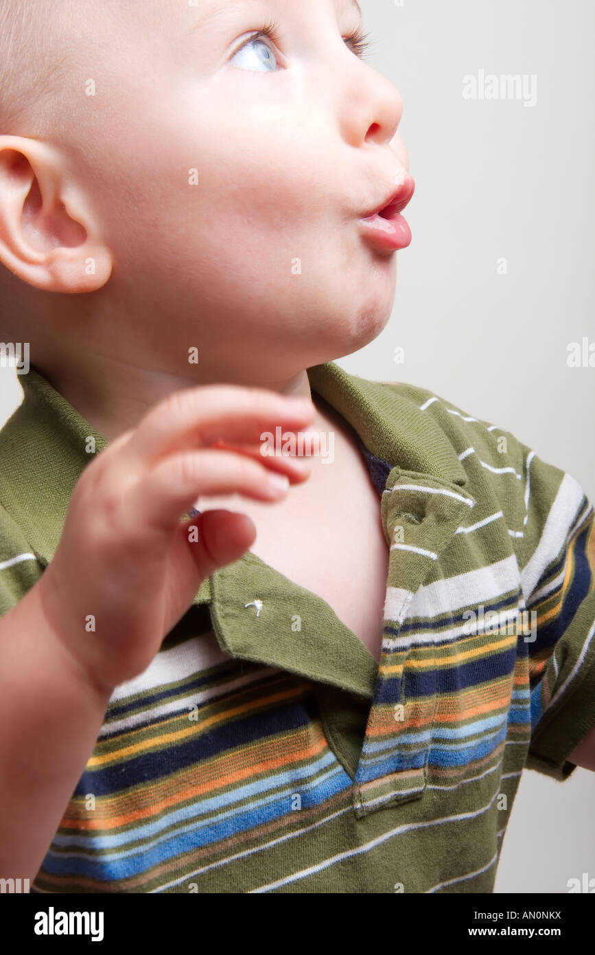 Young Boy White Background Setting Making a Cute Face Stock Photo - Alamy