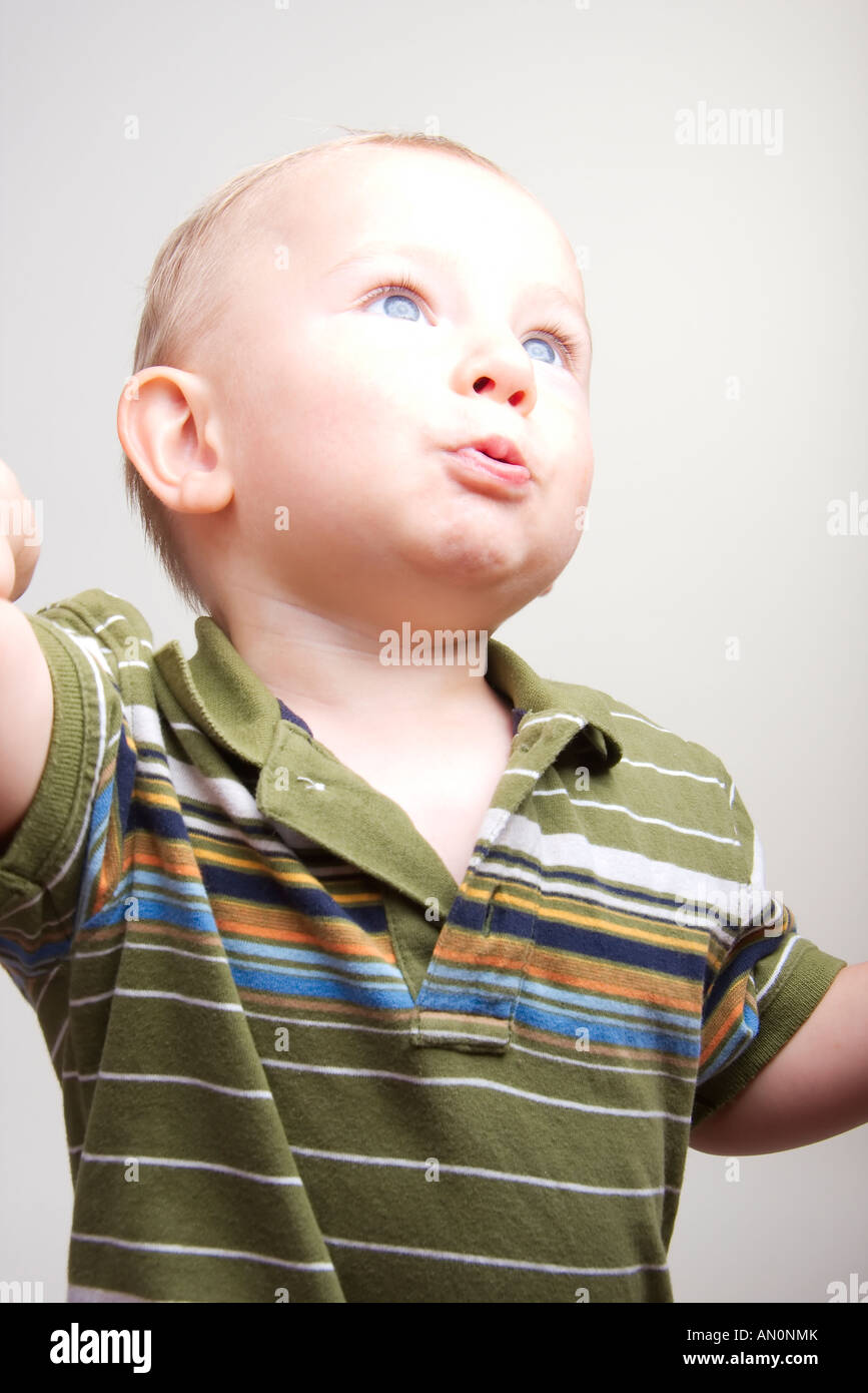 Young Boy White Background Setting Making a Cute Face Stock Photo - Alamy