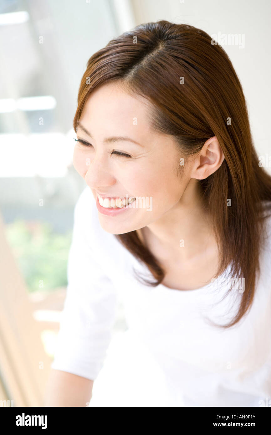 Smiling Japanese woman Stock Photo - Alamy