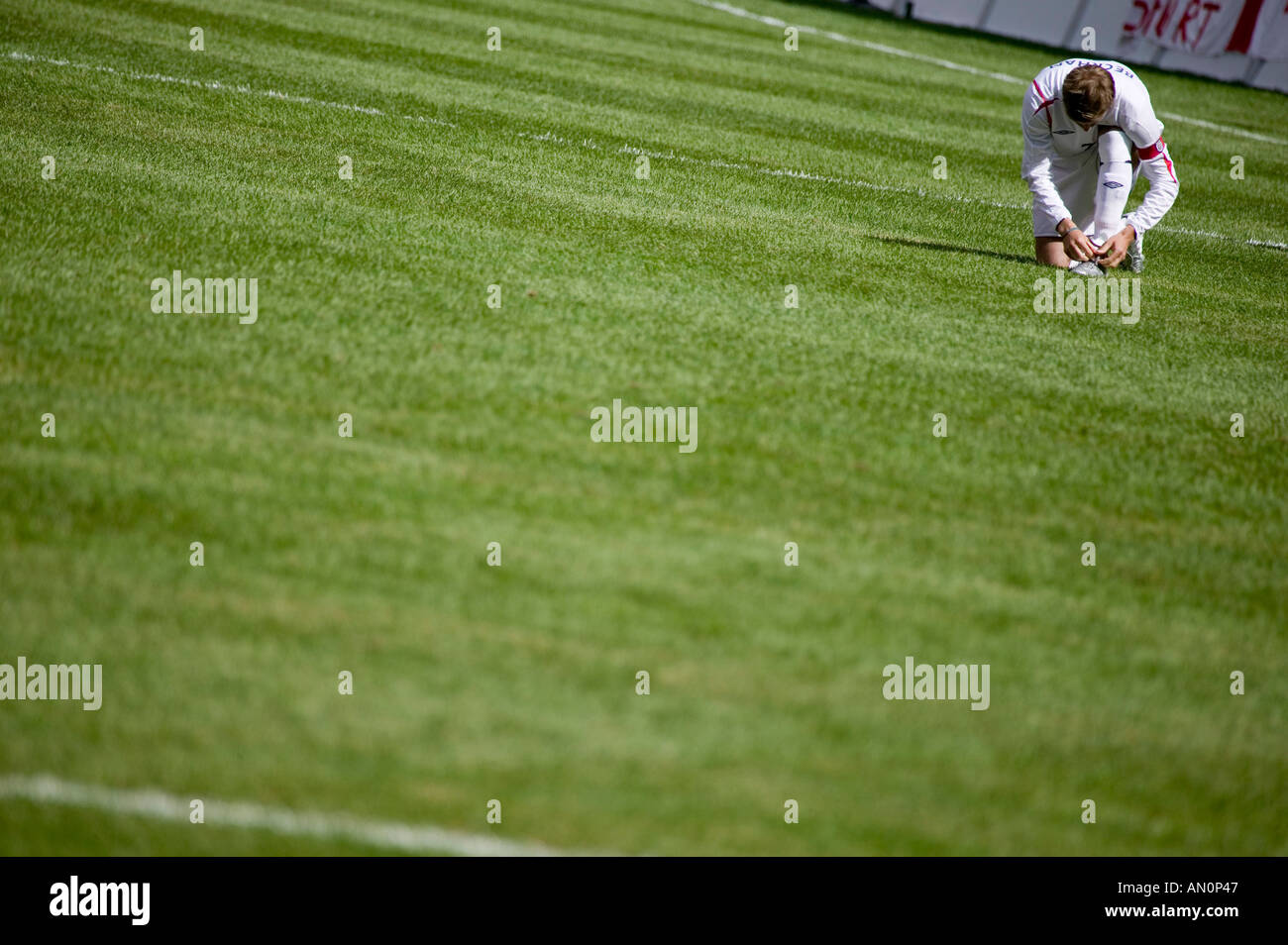 David Beckham ties his shoe lace on the pitch may 2005 Giants Stadium ...