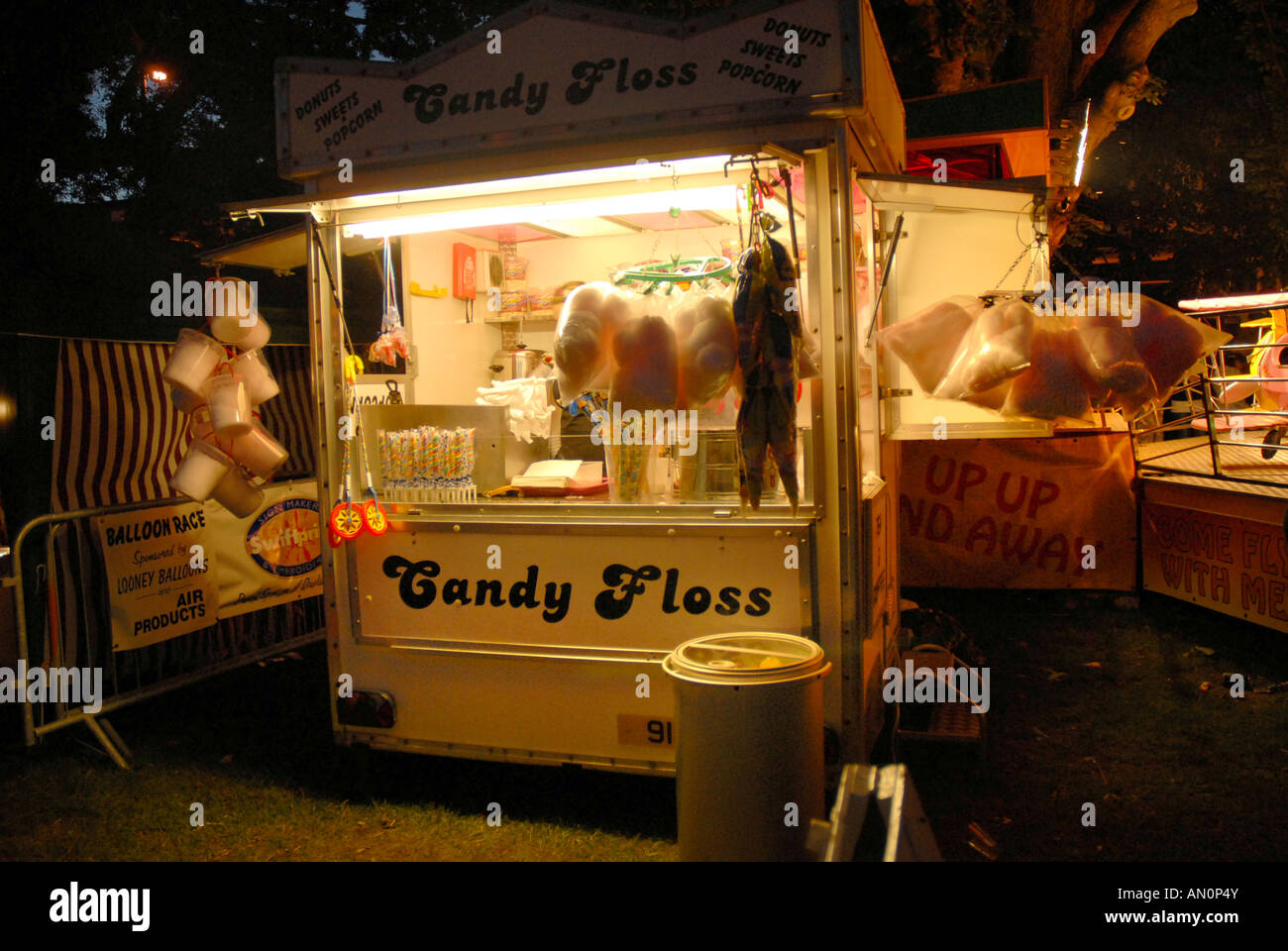 candy floss stall at a fairground during carnival week at a small ...