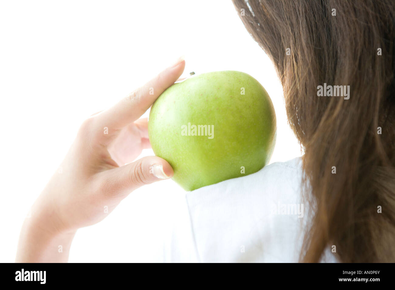 Green apple on the woman's shoulder Stock Photo - Alamy