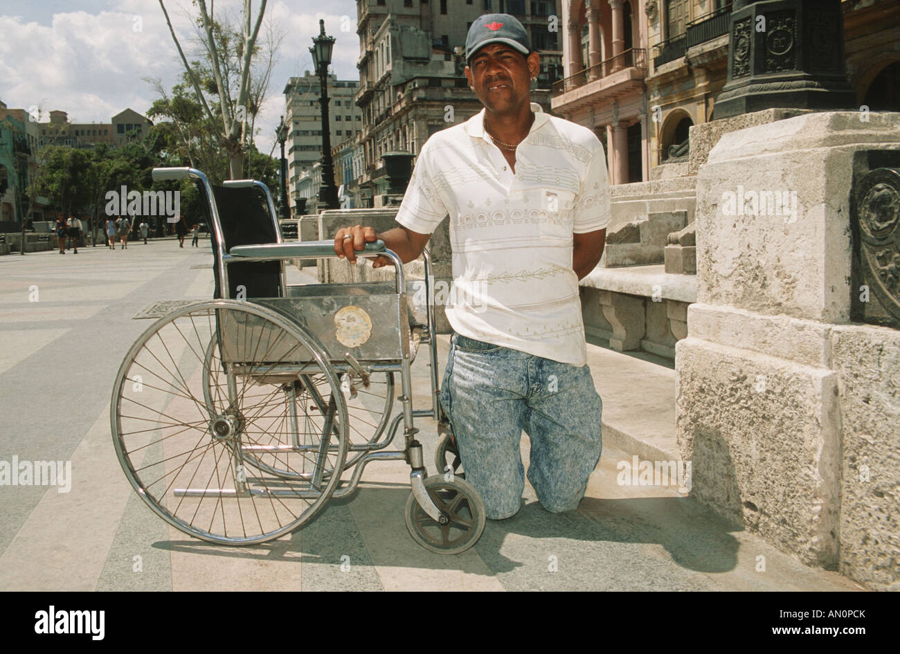 Man with disability, who has had both legs amputated at the knee and is ...