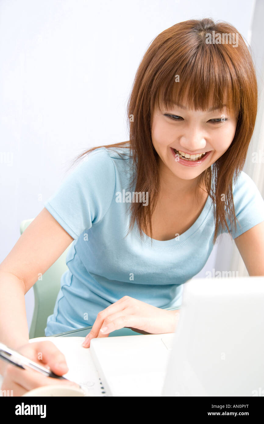 Japanese woman operating a PC Stock Photo - Alamy