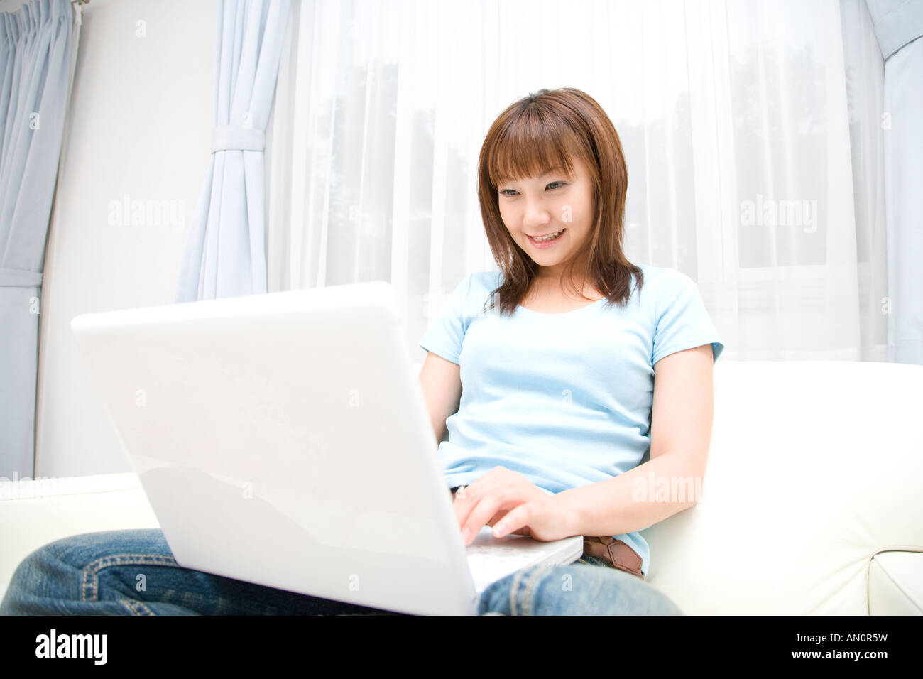 Japanese woman operating a PC Stock Photo - Alamy