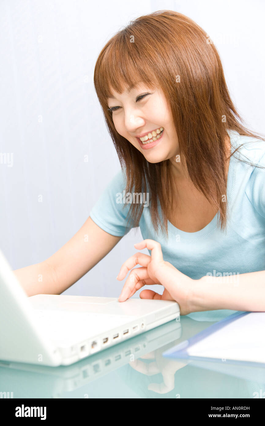Japanese woman operating a PC Stock Photo - Alamy