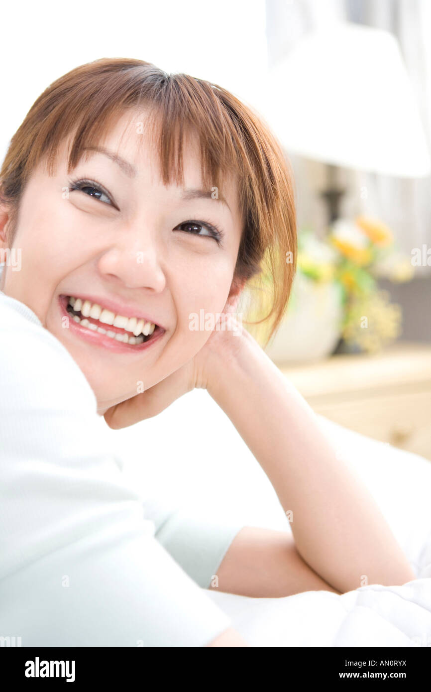 Smiling Japanese woman Stock Photo - Alamy