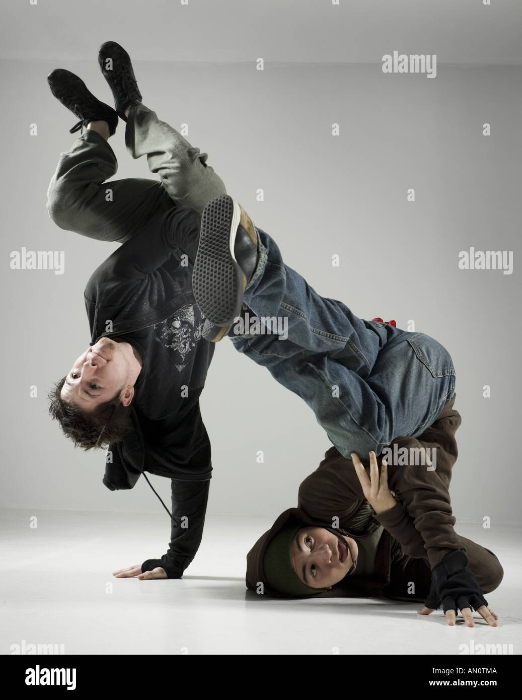 Two young men break dancing Stock Photo - Alamy