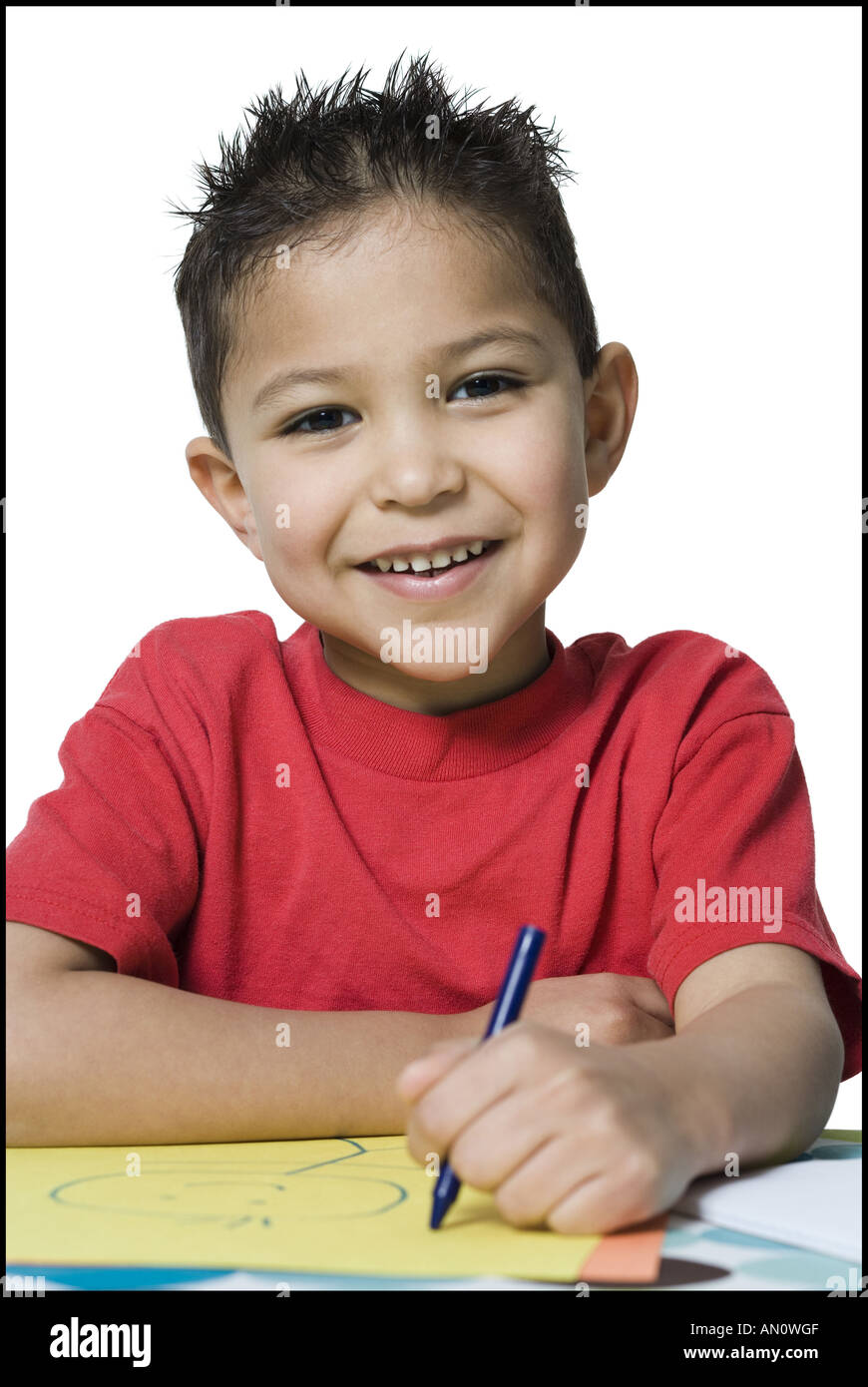 Portrait of a boy drawing with crayons Stock Photo - Alamy