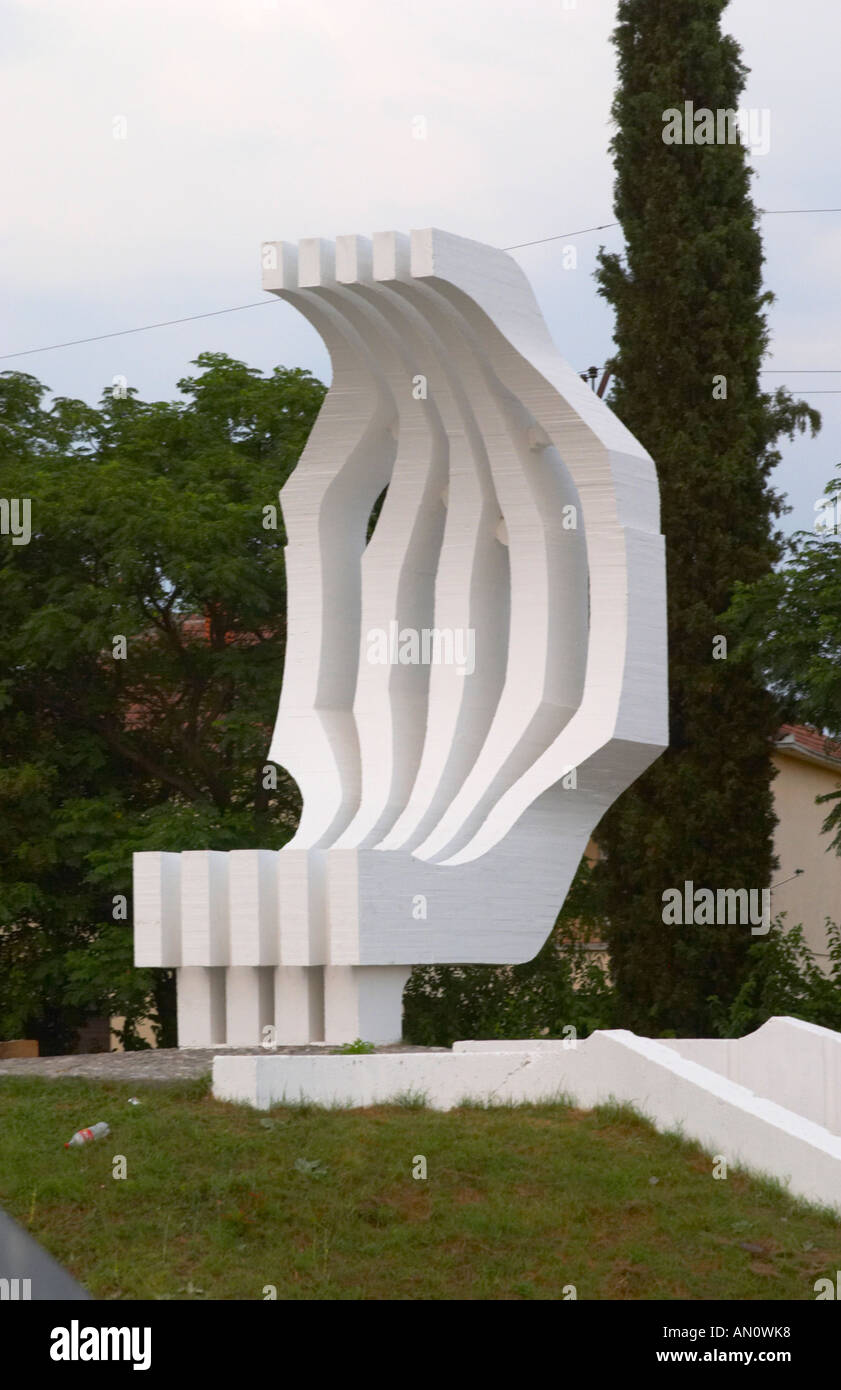 A modern white stone statue in Podgorica with a strange abstract shape ...