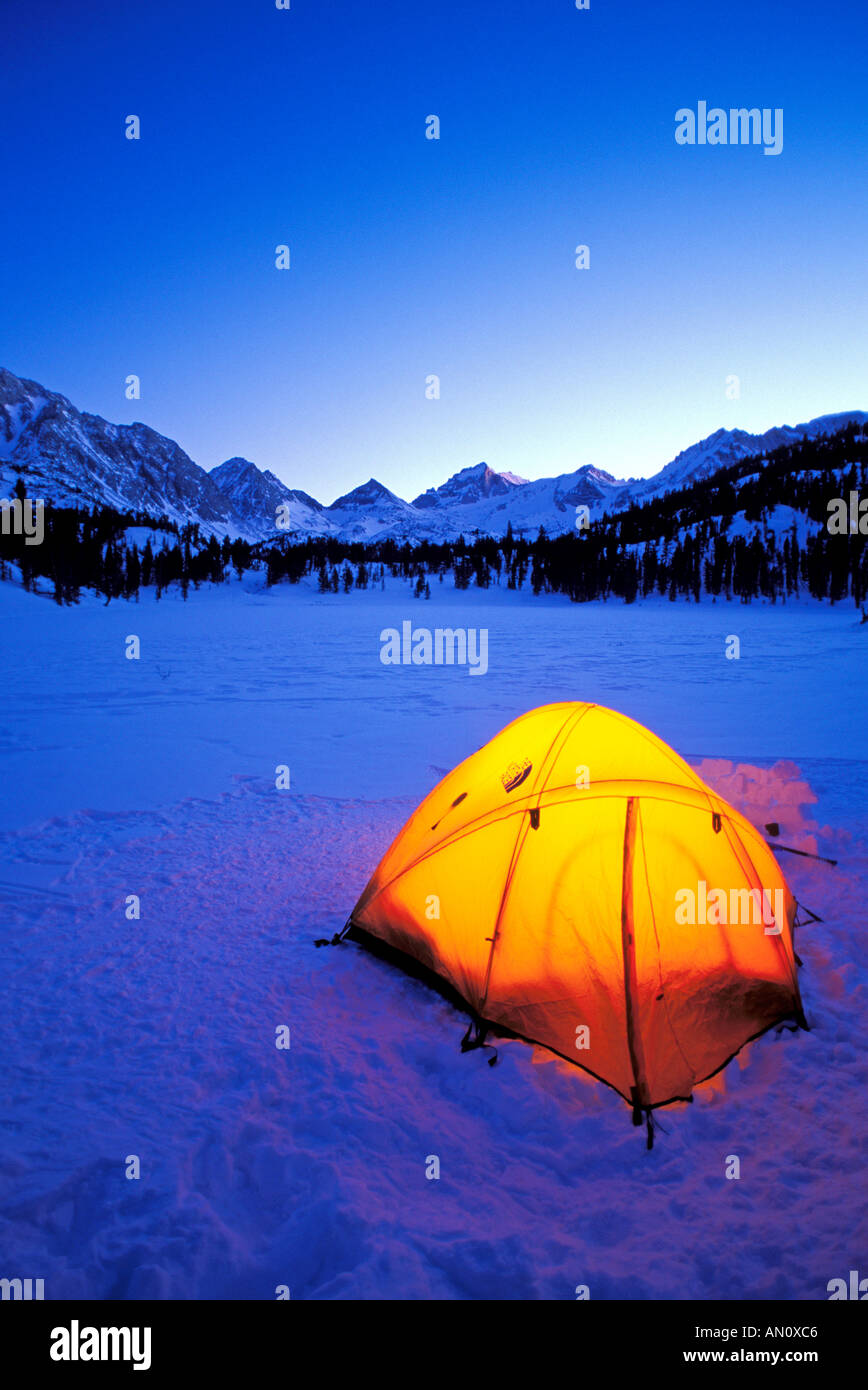 Yellow dome tent at dusk under Bear Creek Spire Little Lakes Valley ...