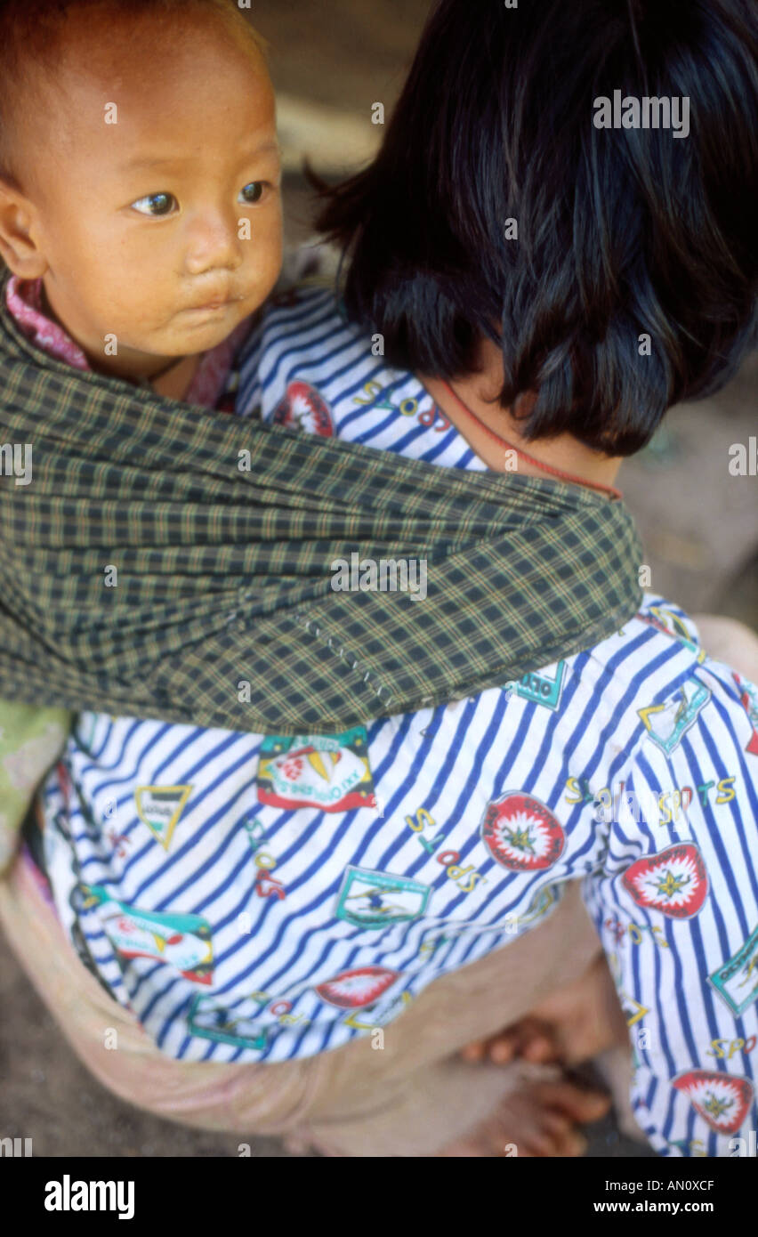 Woman with child on back Myanmar Burma Stock Photo - Alamy