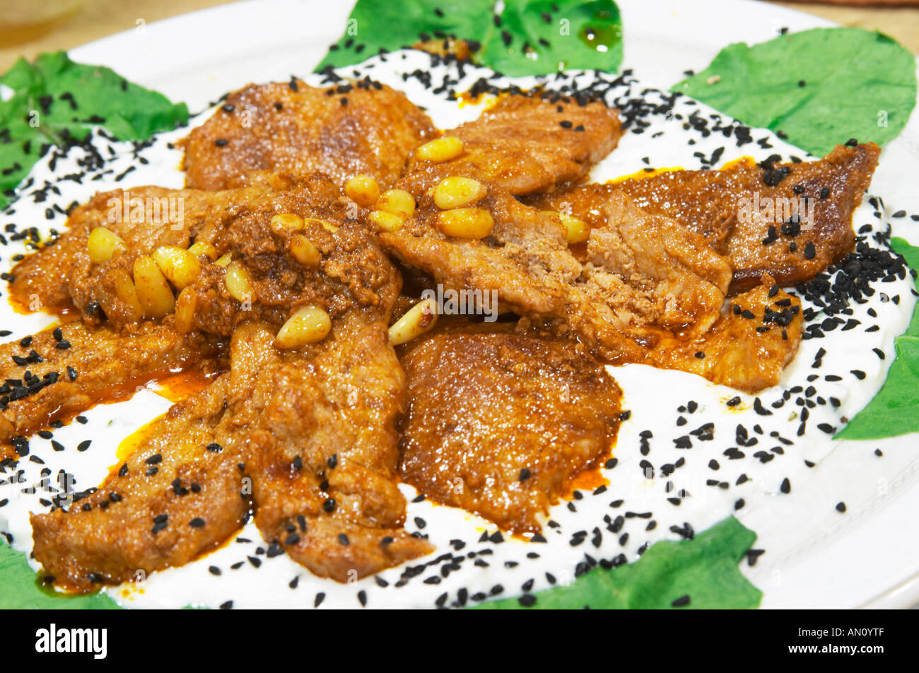 Fried tuna fish in yoghurt sauce with pine nuts. Efendi Efendy ...