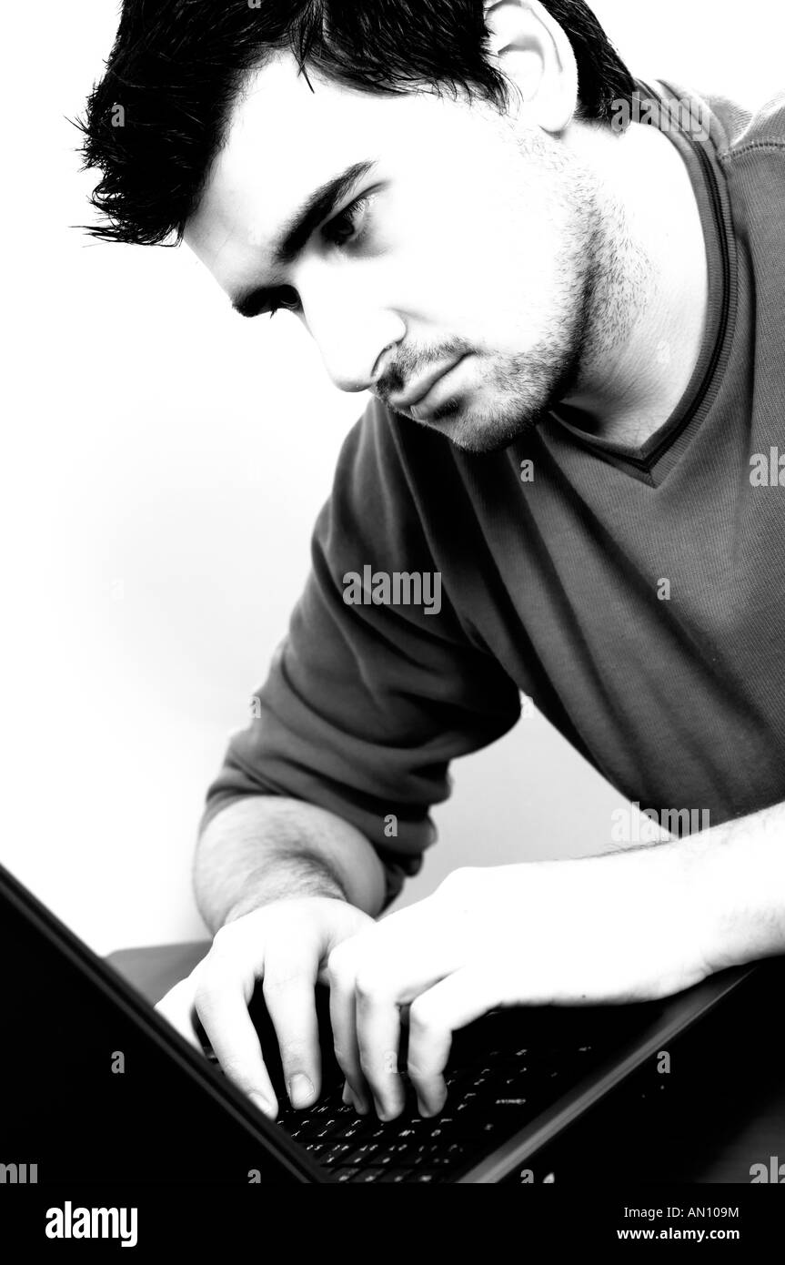 Man typing on laptop Stock Photo - Alamy