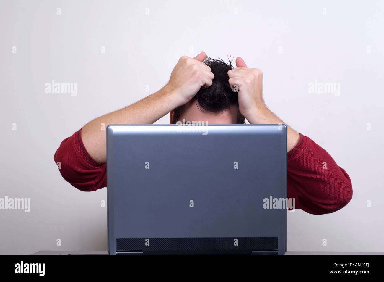 Pulling hair and computer hi-res stock photography and images - Alamy