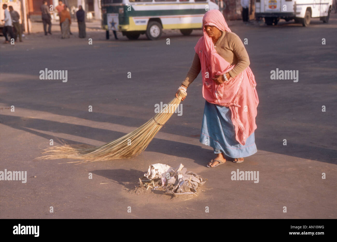 Woman street sweeper hi-res stock photography and images - Alamy