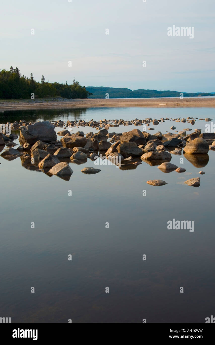 Water with rocks and sandbar Stock Photo - Alamy