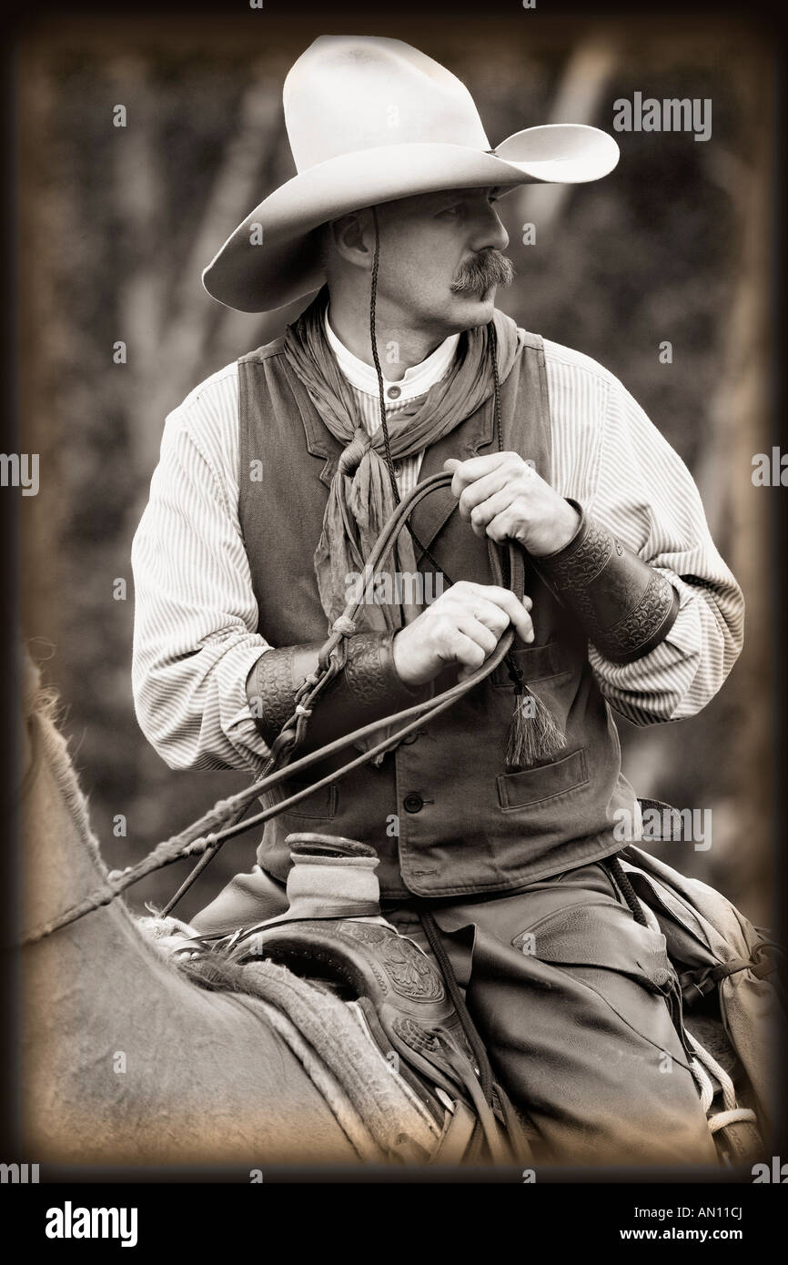 Cowboy on horseback Stock Photo - Alamy