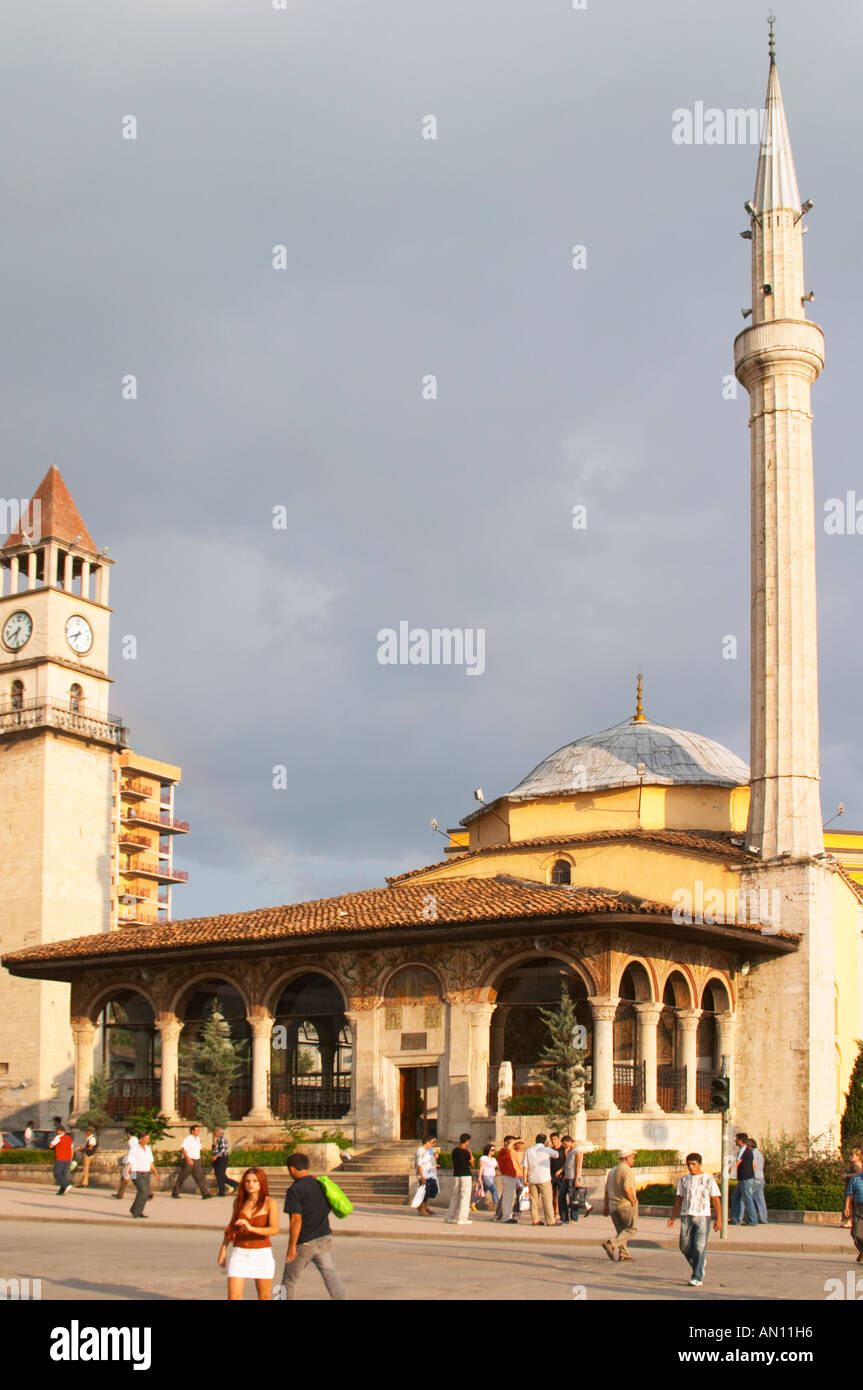 The Ethem Bey Beu Mosque. People and cars on the street in front. The ...
