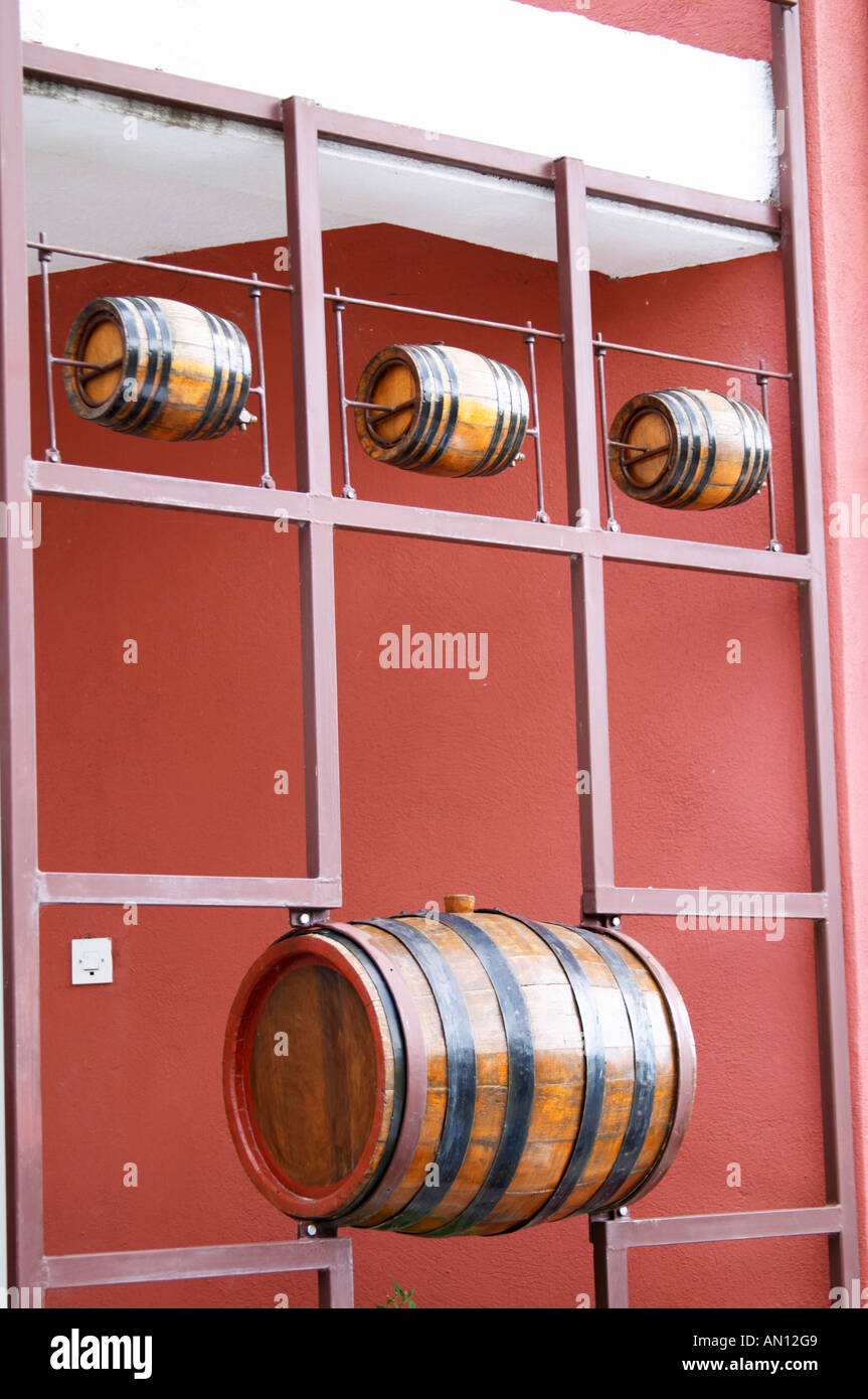 Decoration of small wine barrels outside the winery. Vukoje winery ...