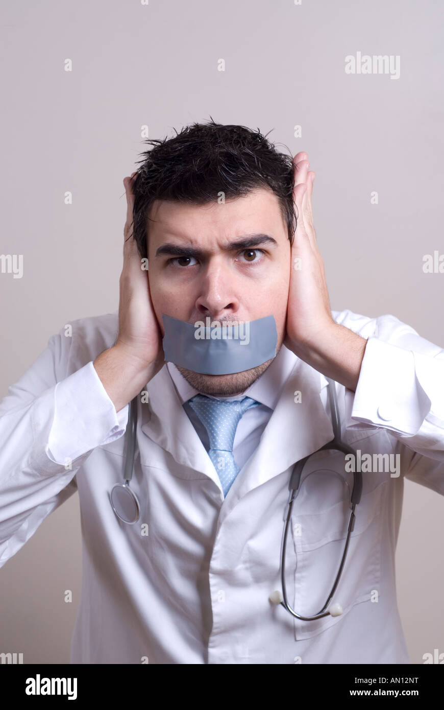 Ears taped hi-res stock photography and images - Alamy