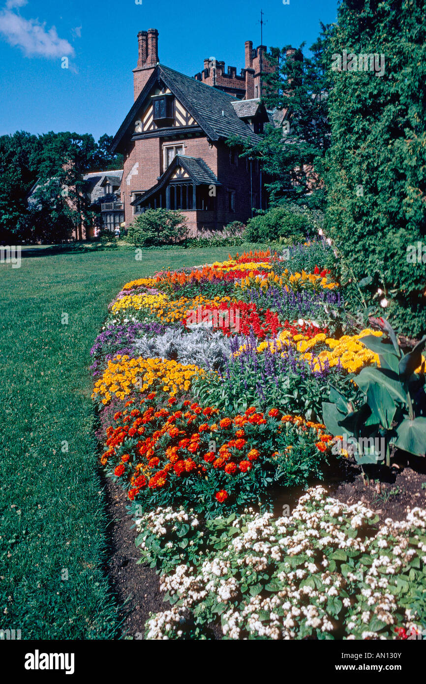 Flower garden in front yard of a tudor mansion USA Stock Photo - Alamy