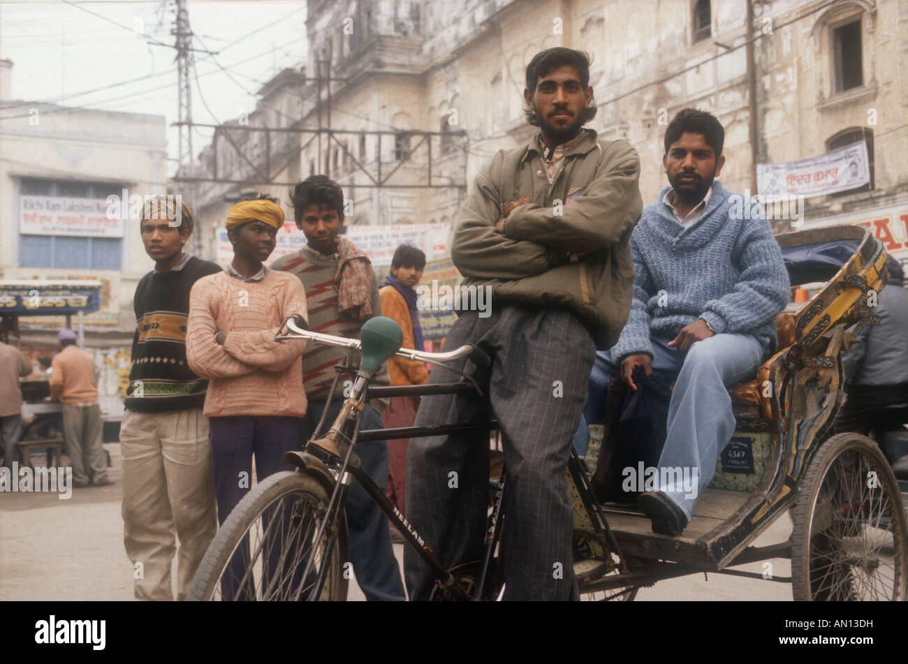 Cycle rickshaw with driver and friends in Patiala, India Stock Photo ...