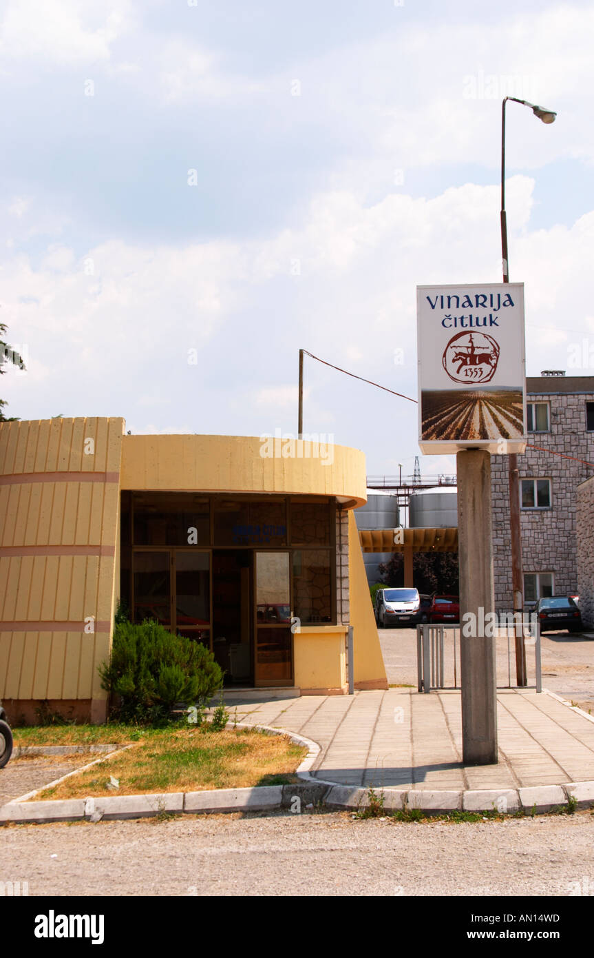 The entrance to the winery, the gate, the main winery building and a ...