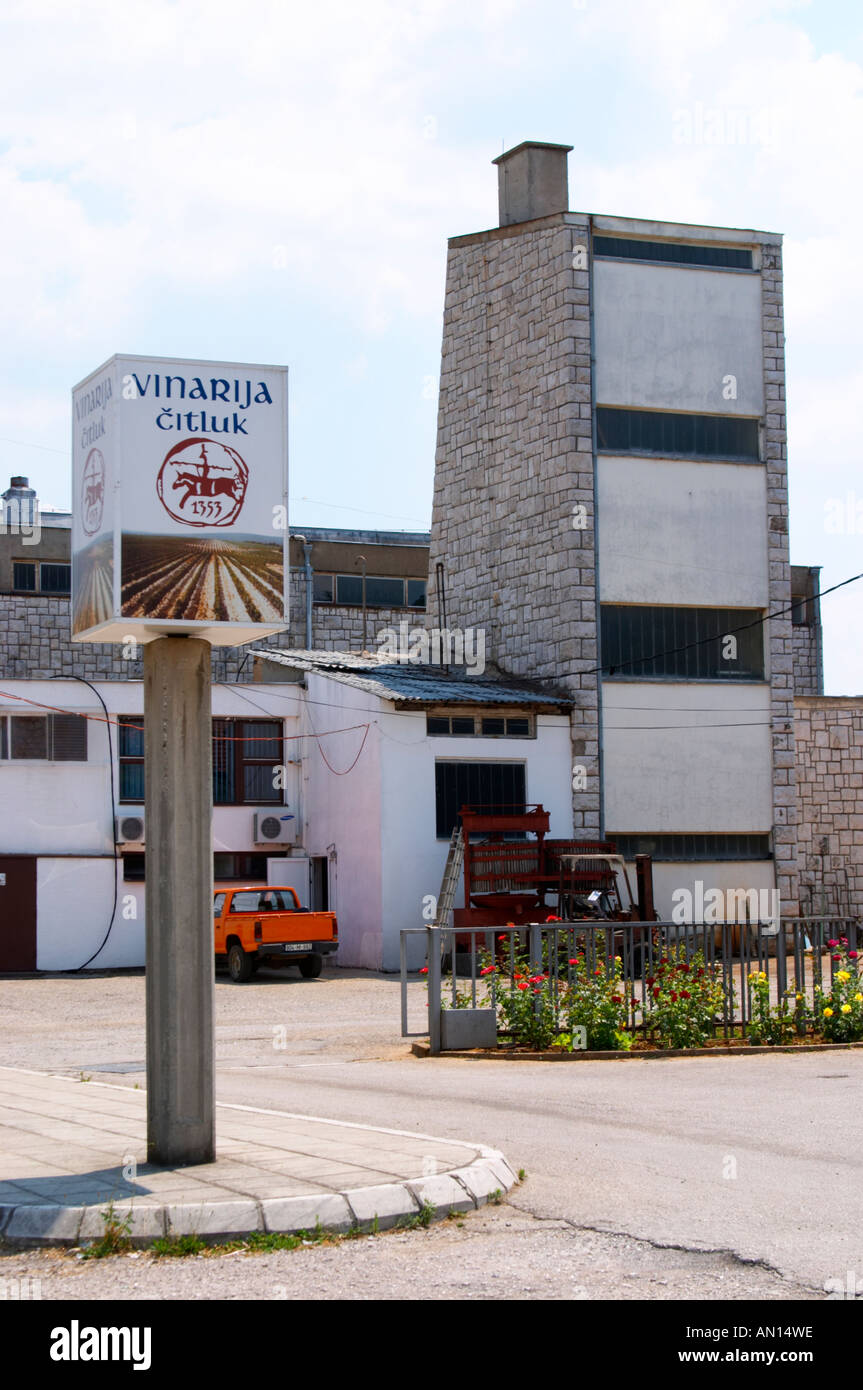 The entrance to the winery, the gate, the main winery building and a ...