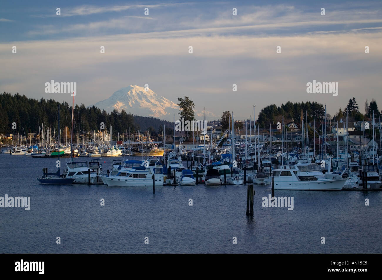 Sunset view of Gig Harbor Washington with snow capped Mount Rainier in ...
