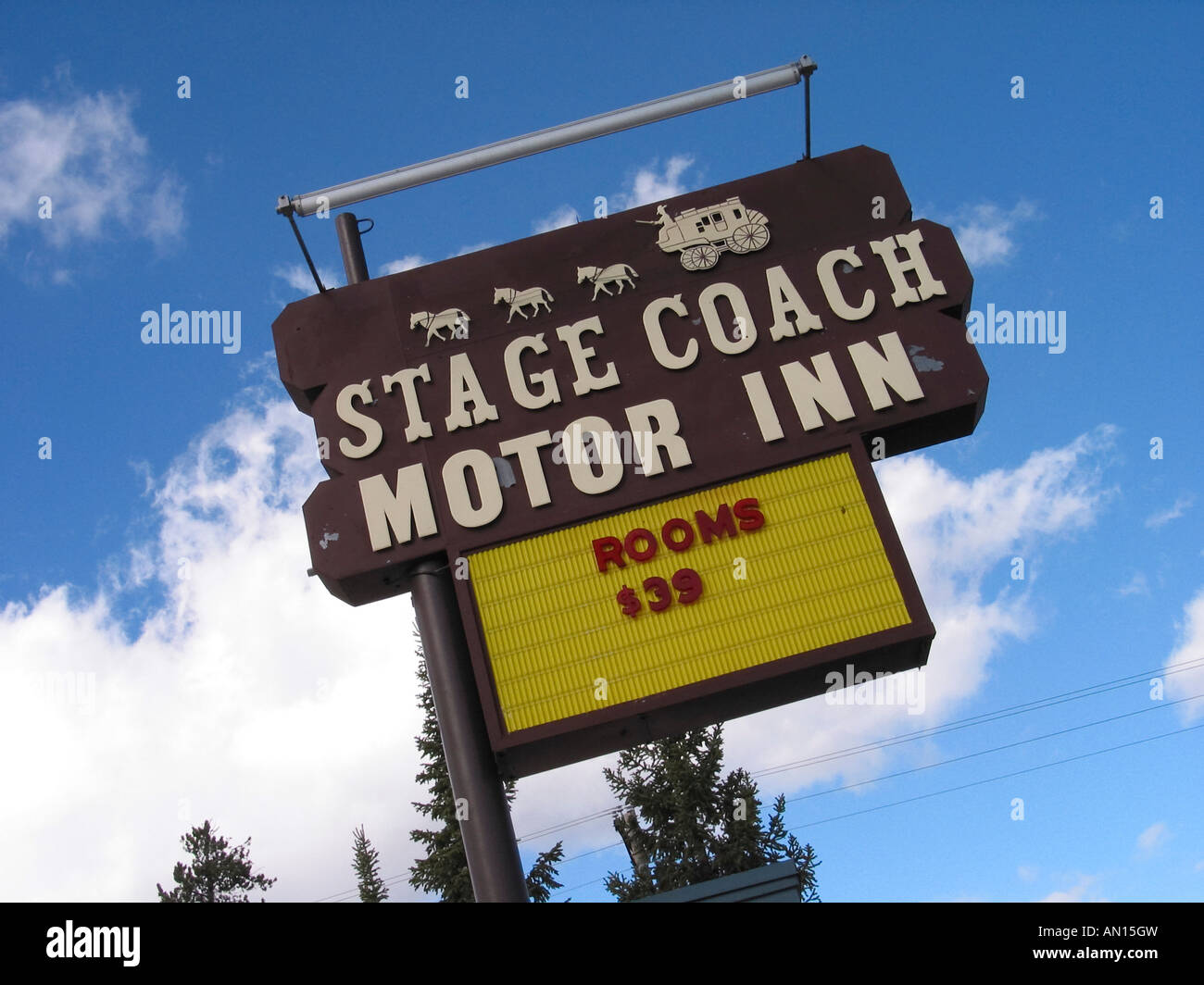 USA, Montana, West Yellowstone. Stage Coach Motor Inn sign Stock Photo ...