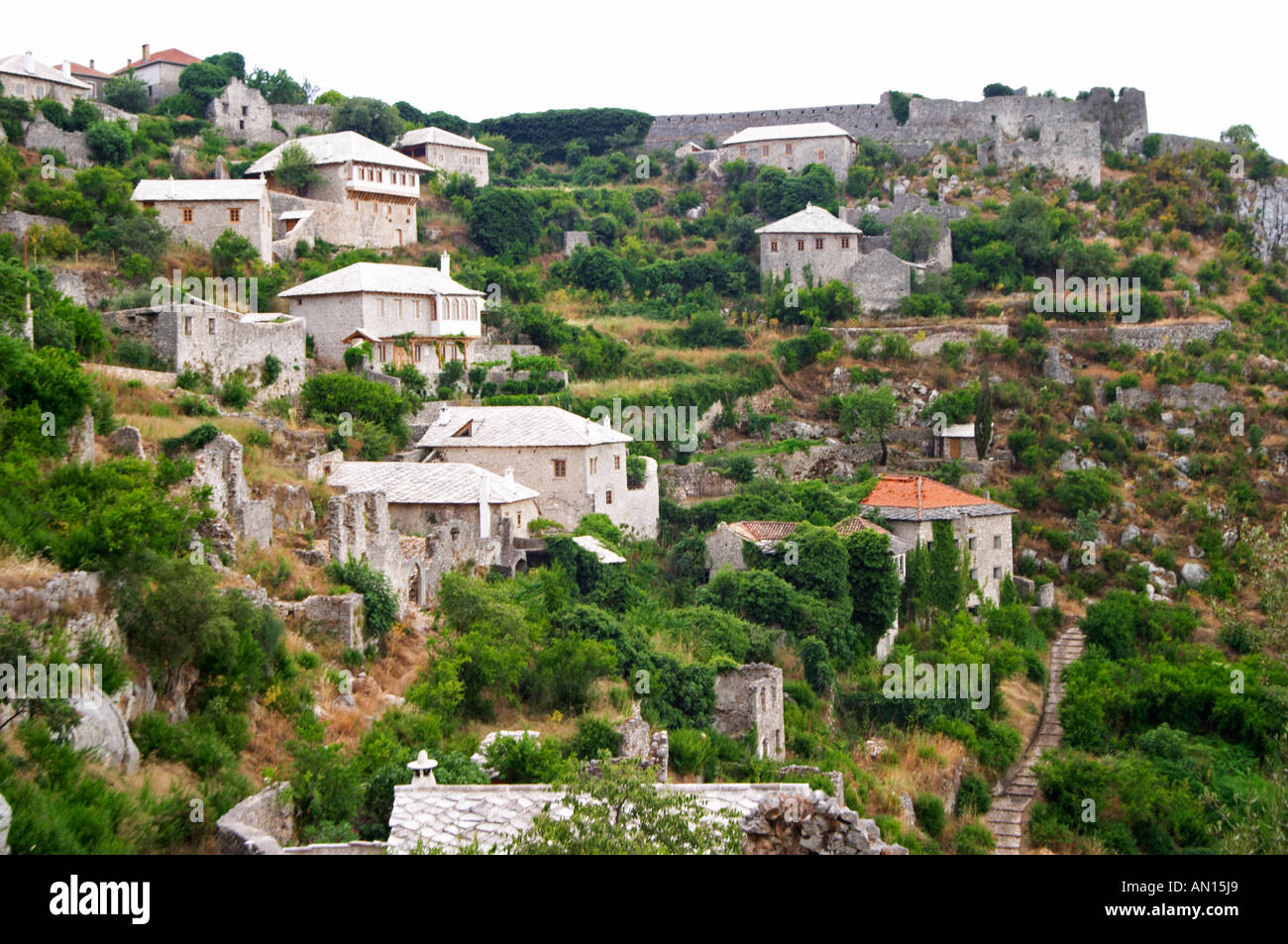 View over the town with mosque and church towers. River Neretva.. House ...