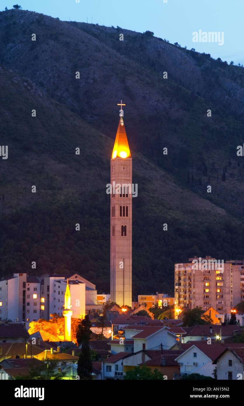 View over the city at sunset. Mosque minarets. Franciscan Monastery and ...