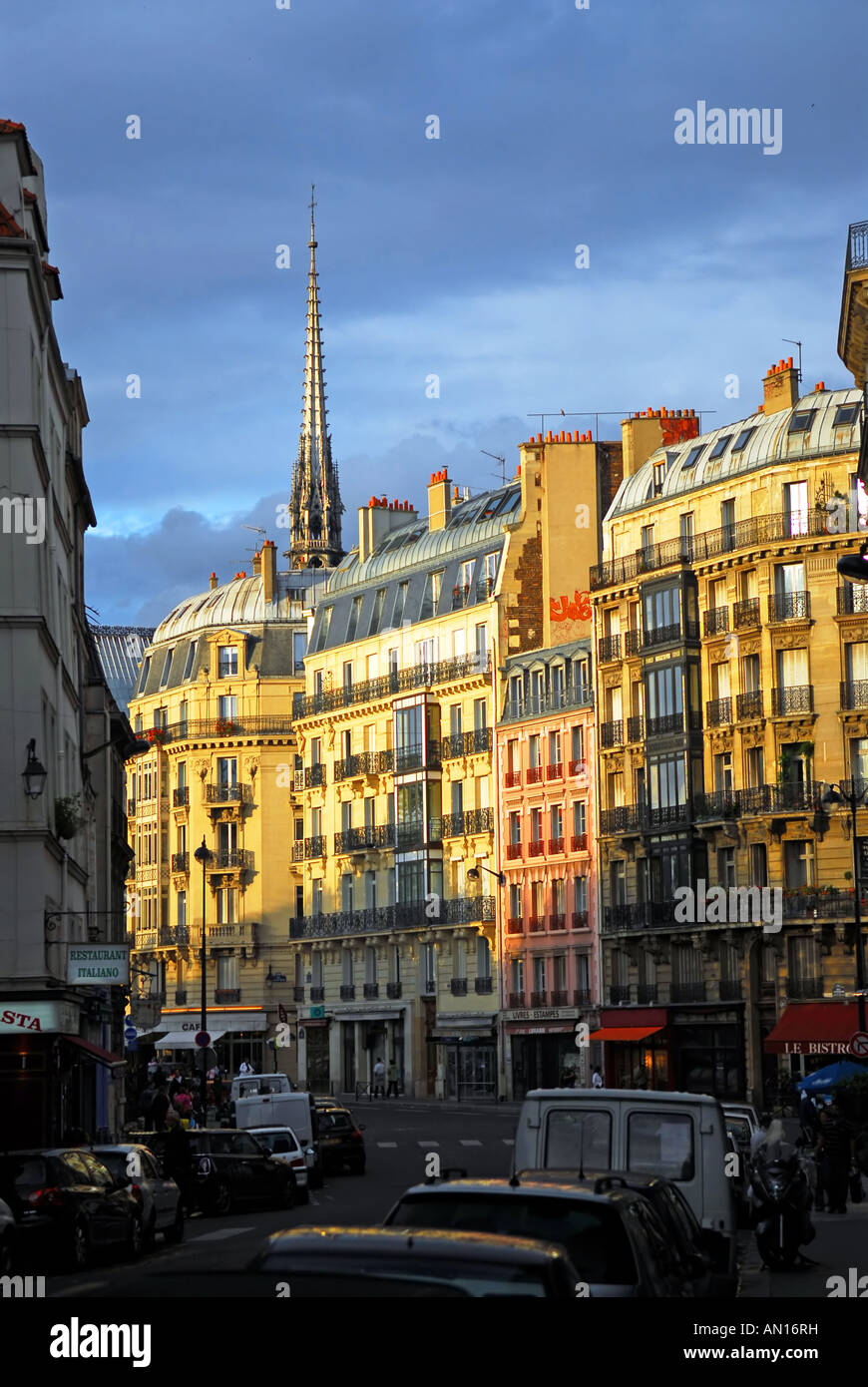 Paris street with colorful houses at sunset France Stock Photo - Alamy