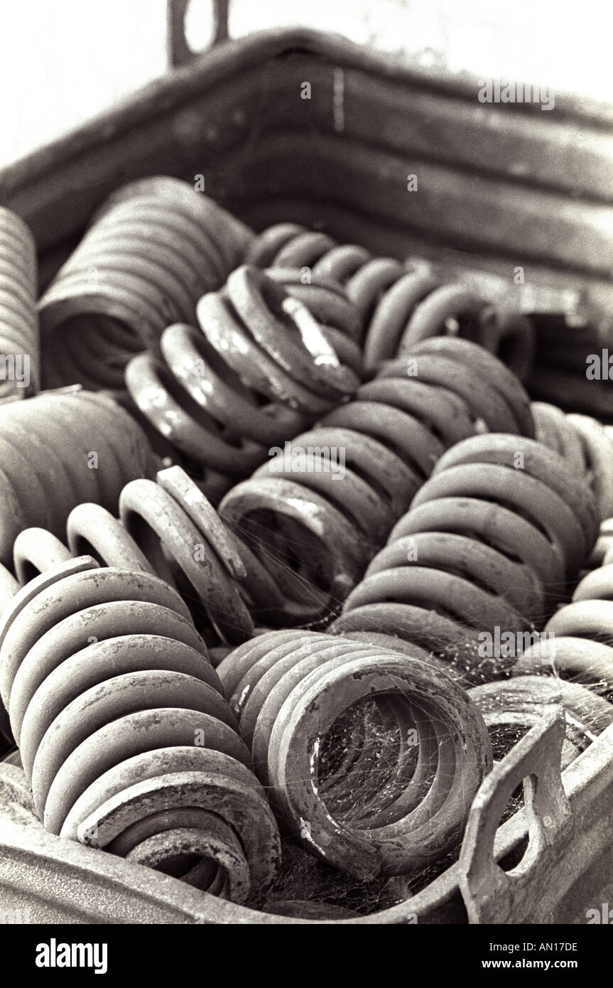 Springs in a railyard that are used on a train Stock Photo - Alamy