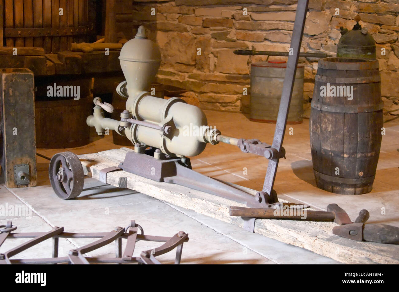 An old winery pump on display in the tasting room. Toreta Vinarija ...
