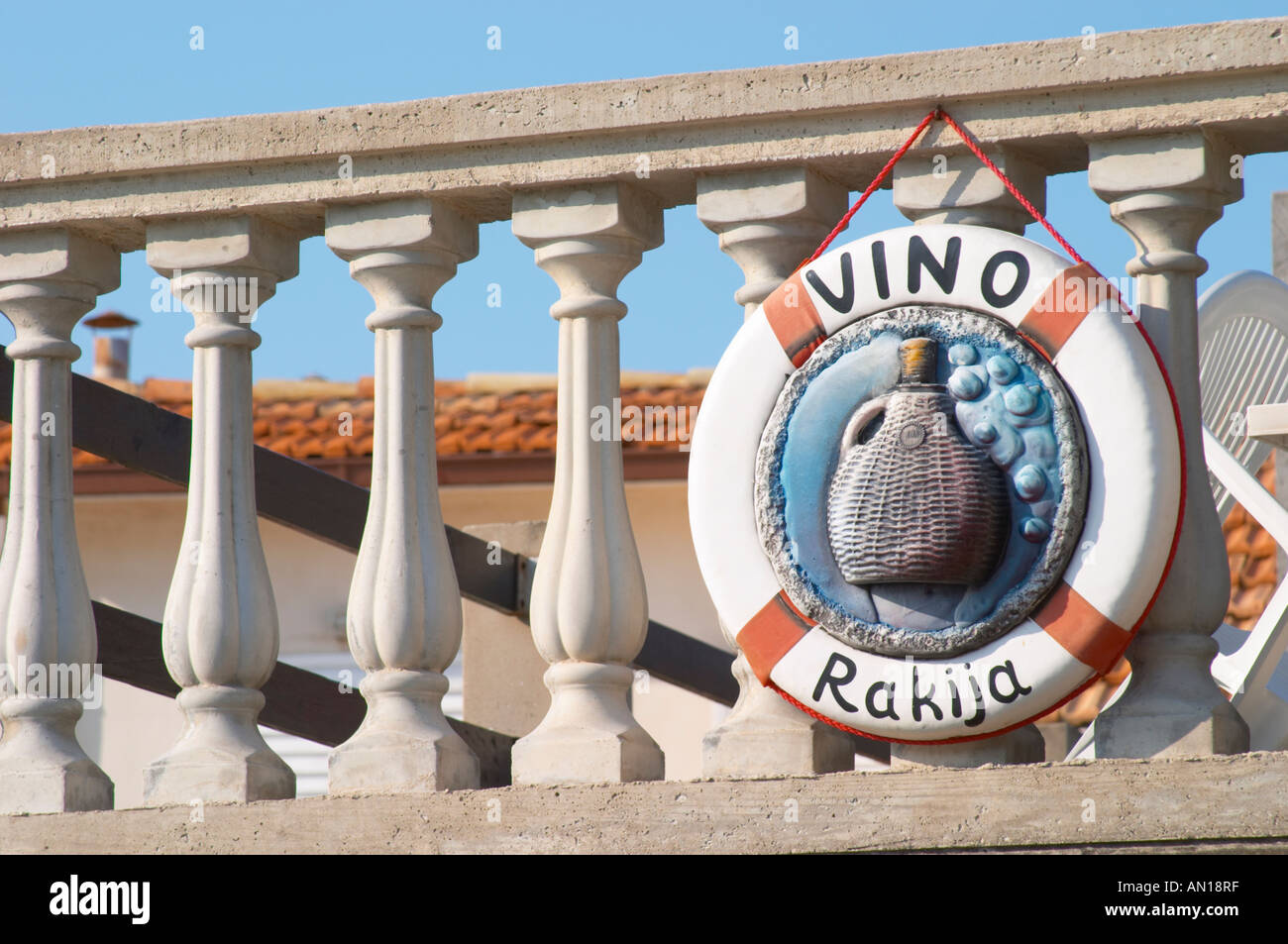 Sign looking like a life buoy advertising Vino wine and Rakija grappa ...