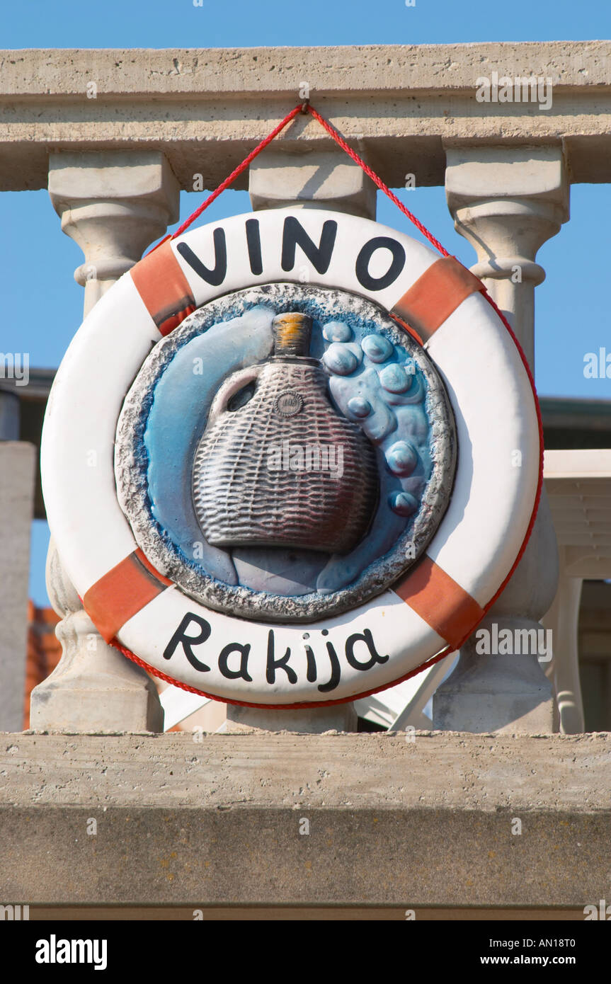 Sign looking like a life buoy advertising Vino wine and Rakija grappa ...