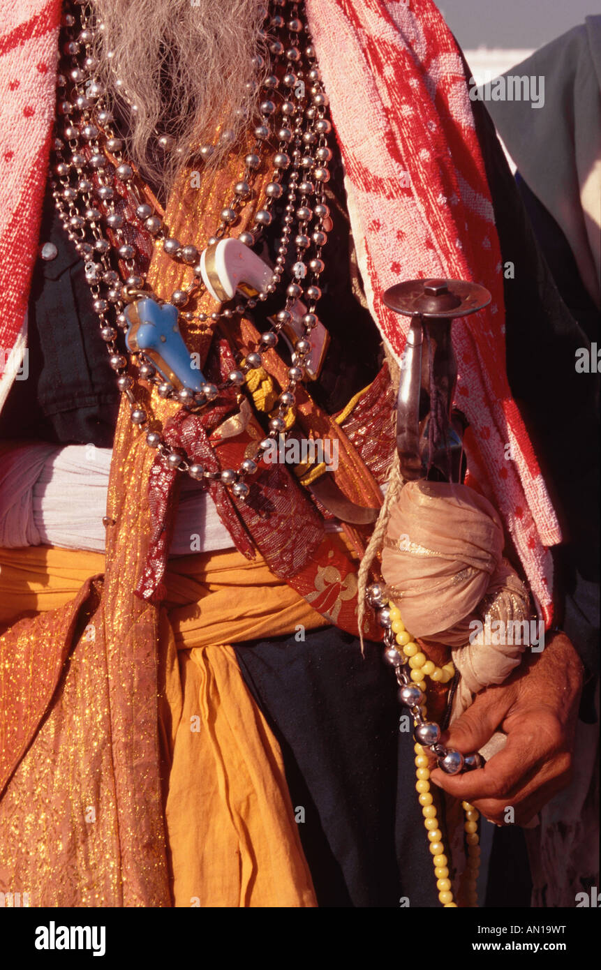 Close-up of a Sikh man's possessions including beads and daggers at the ...