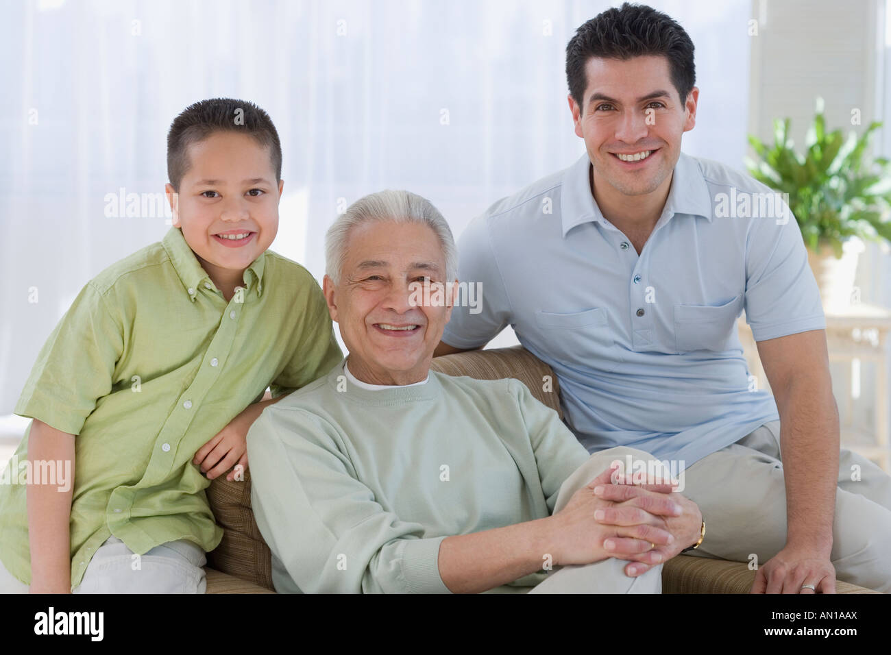 Portrait of multi-generational Hispanic male family members Stock Photo ...