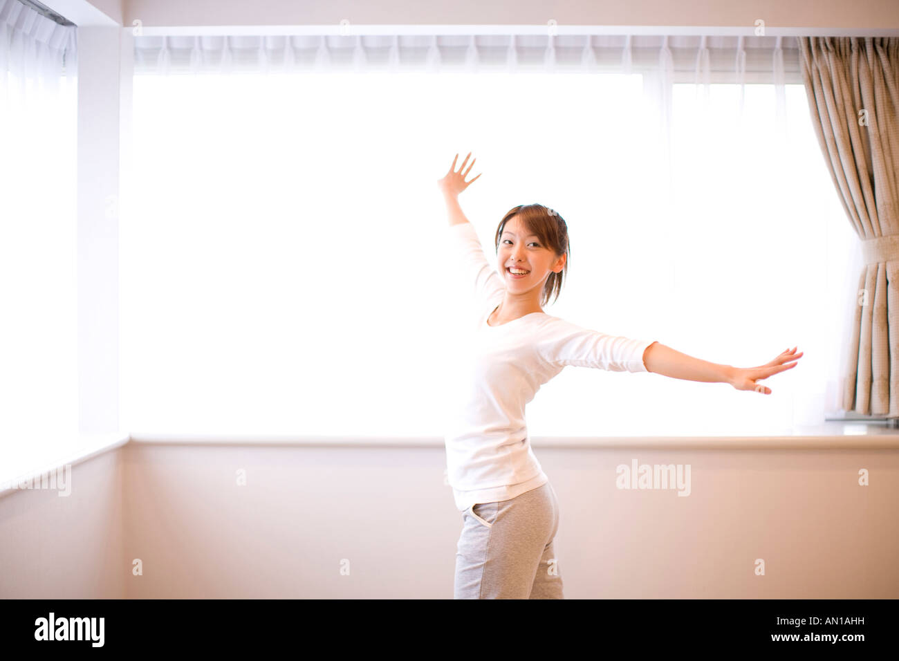 Japanese woman doing exercise Stock Photo - Alamy
