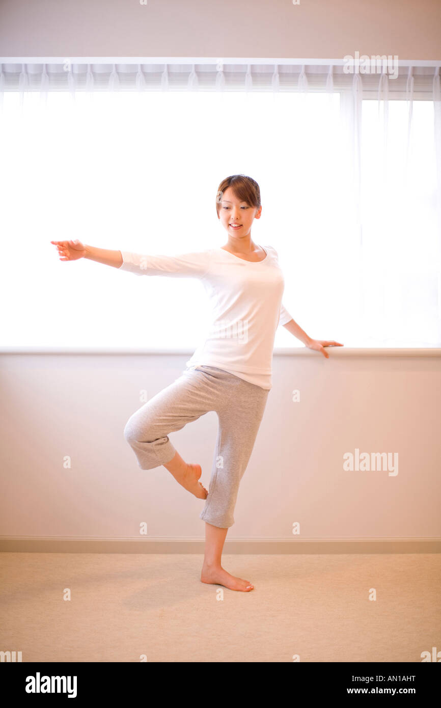 Japanese woman doing exercise Stock Photo - Alamy