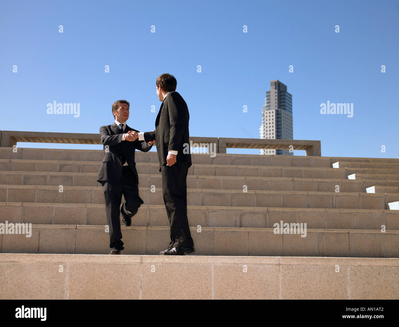 Two men shaking hands Stock Photo - Alamy