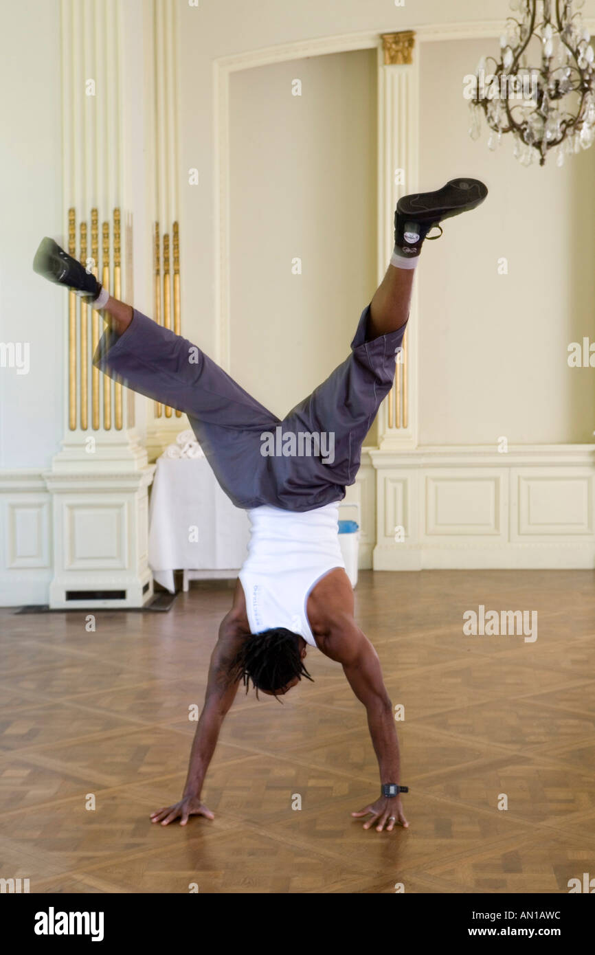 Back of man doing handstand Stock Photo - Alamy