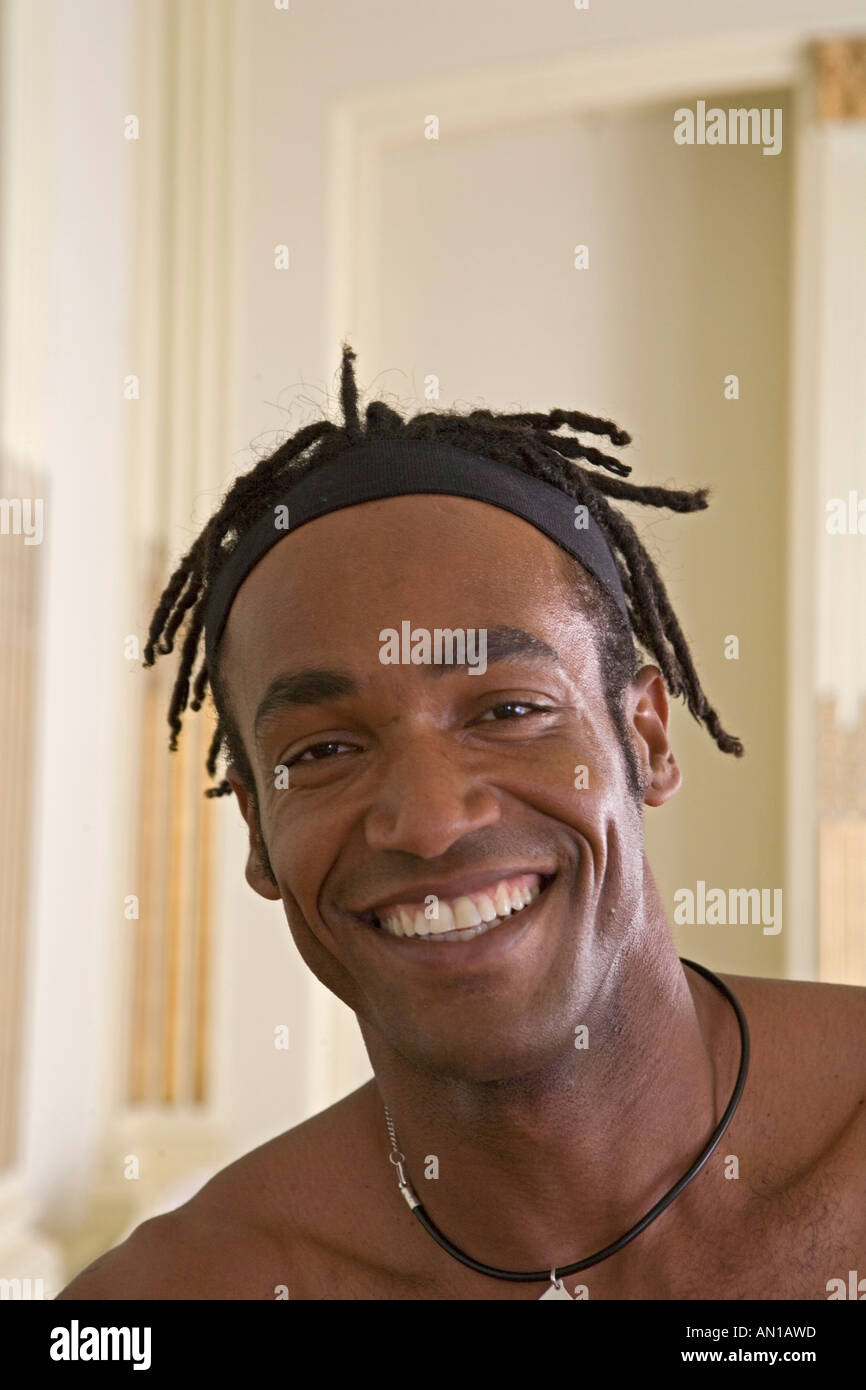 Charismatic young man smiling hi-res stock photography and images - Alamy
