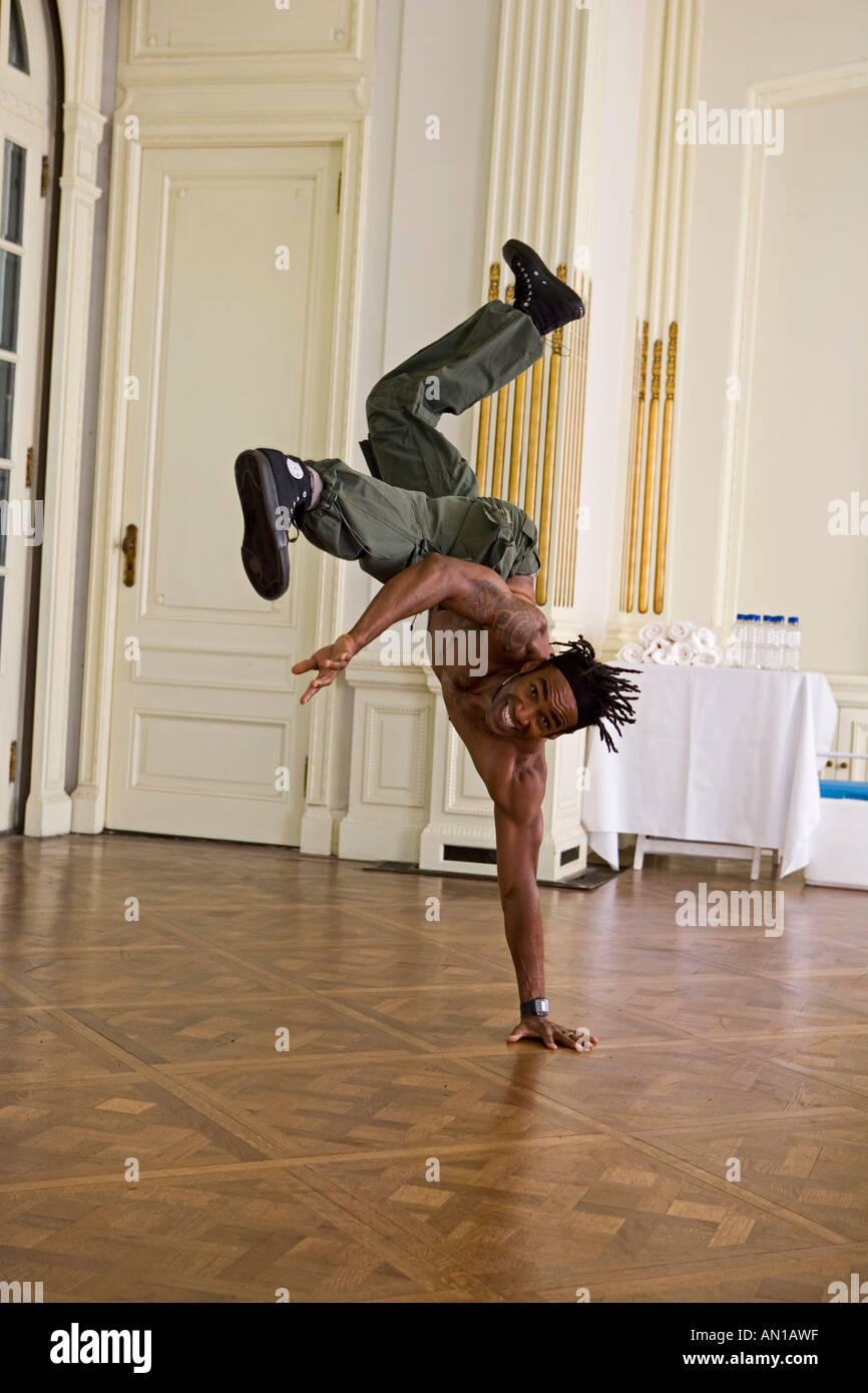 Young man break dancing Stock Photo - Alamy
